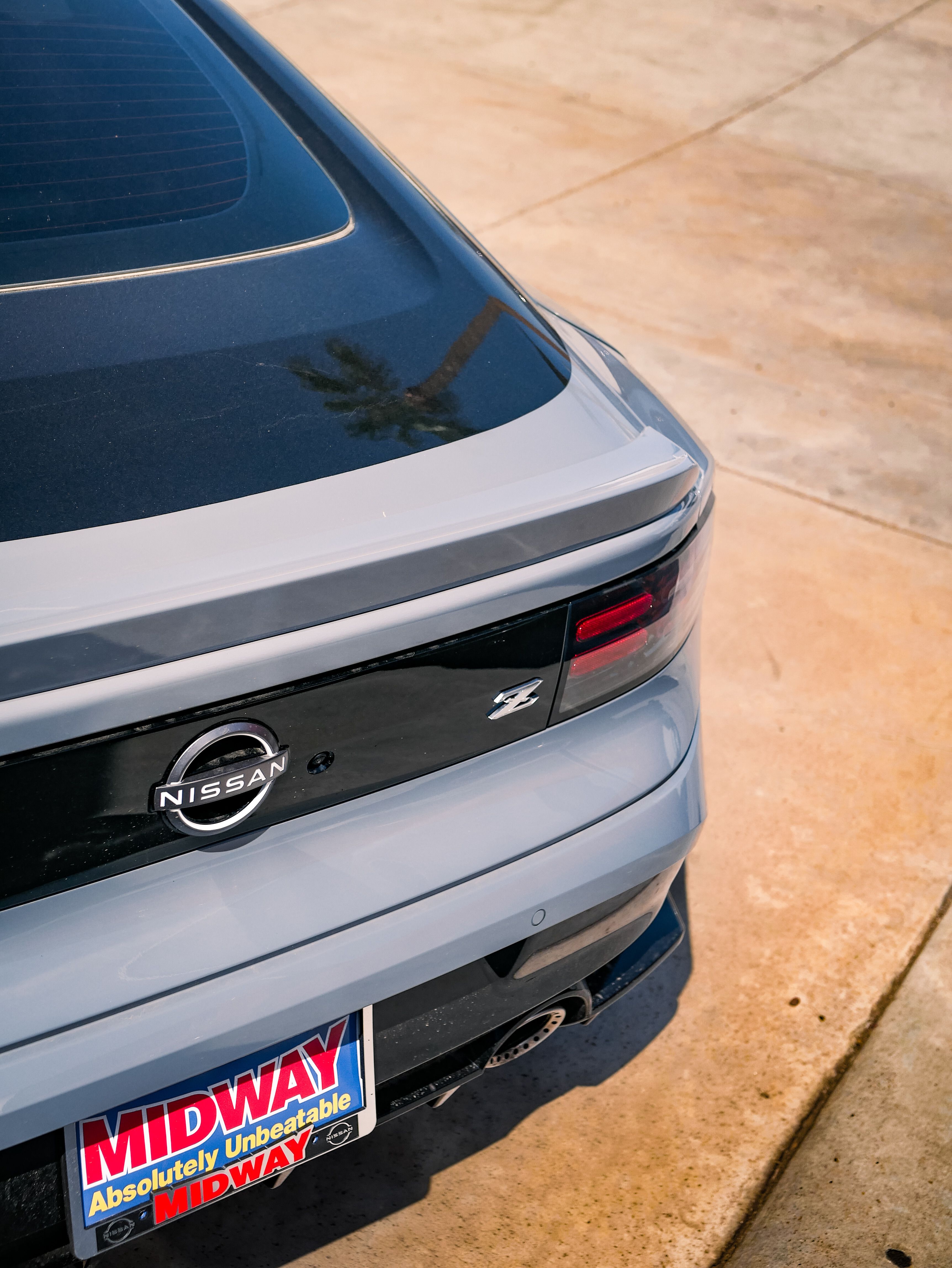 The rear end of a car with a license plate · Free Stock Photo