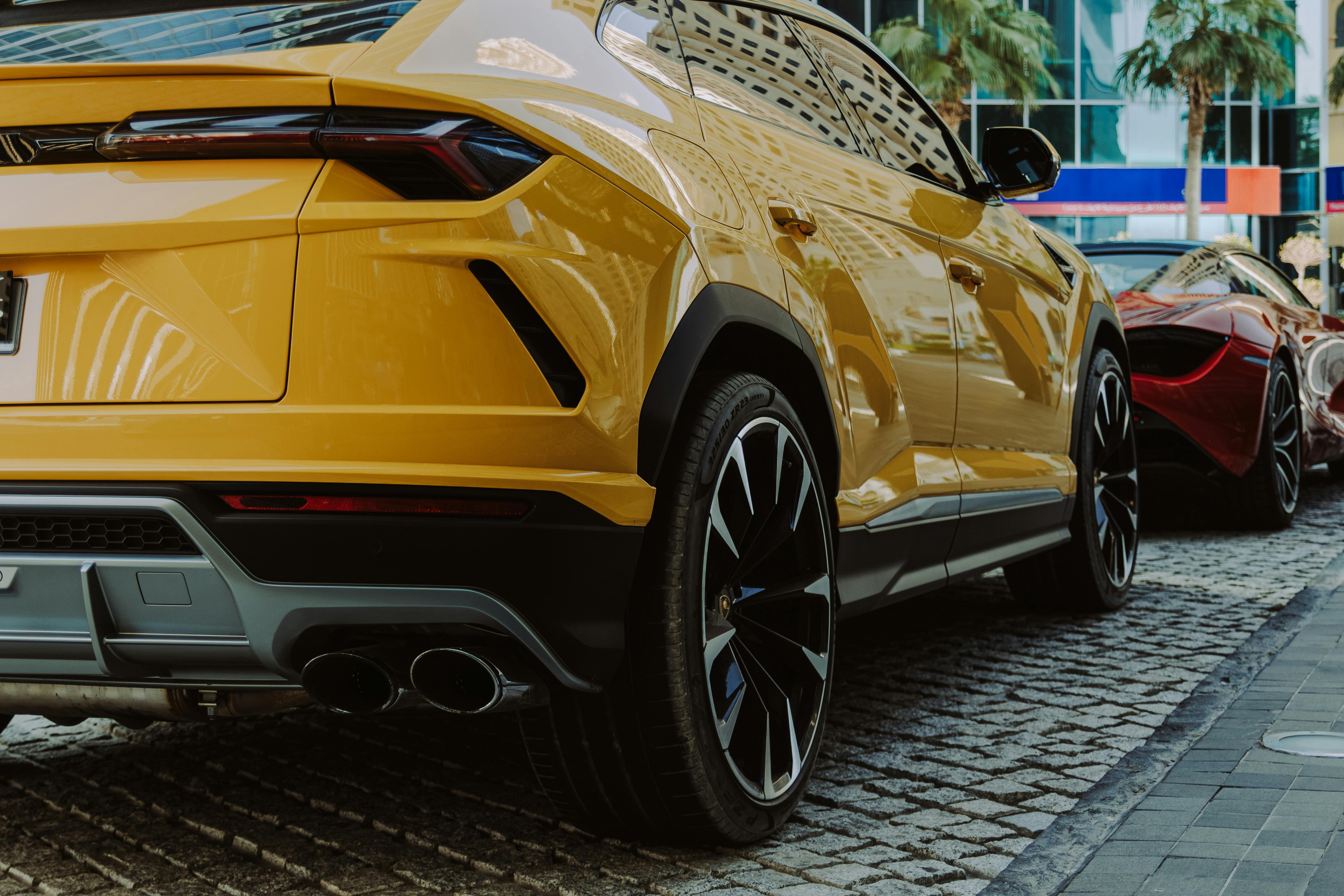 Close-up of a luxury yellow Lamborghini sports car with stylish black ...