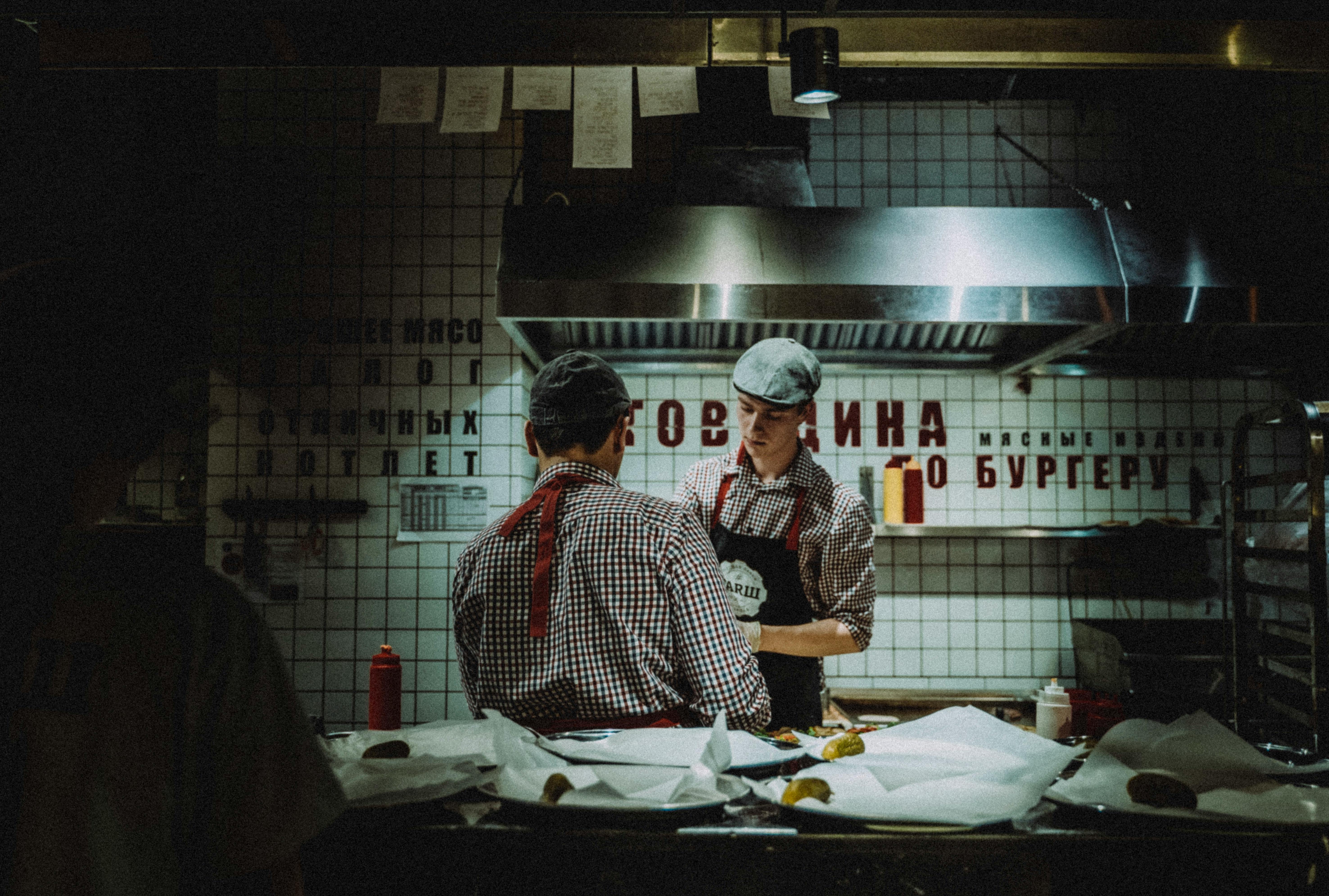 People Inside Commercial Kitchen · Free Stock Photo