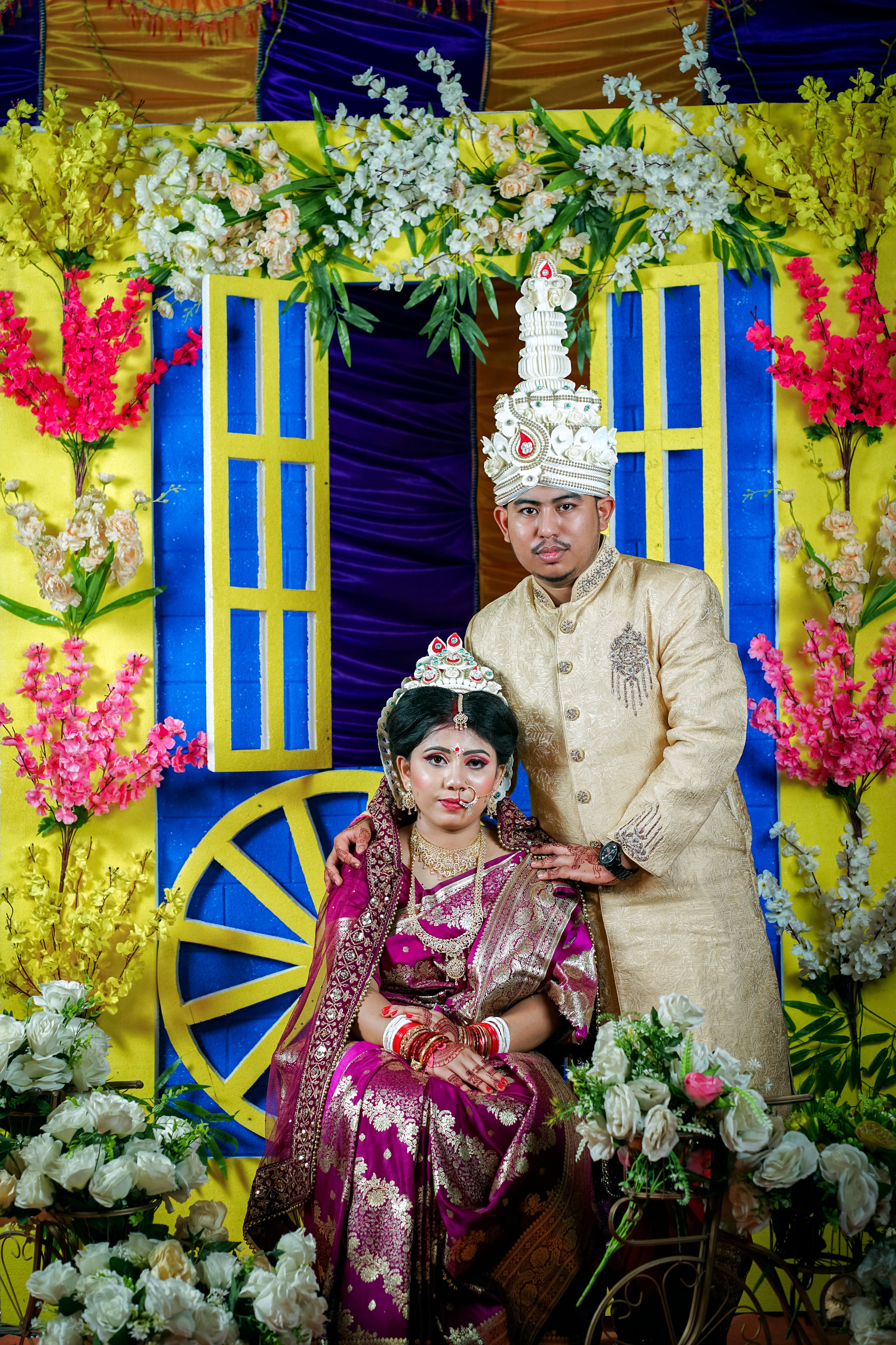 A man and woman in traditional attire pose for a photo · Free Stock Photo