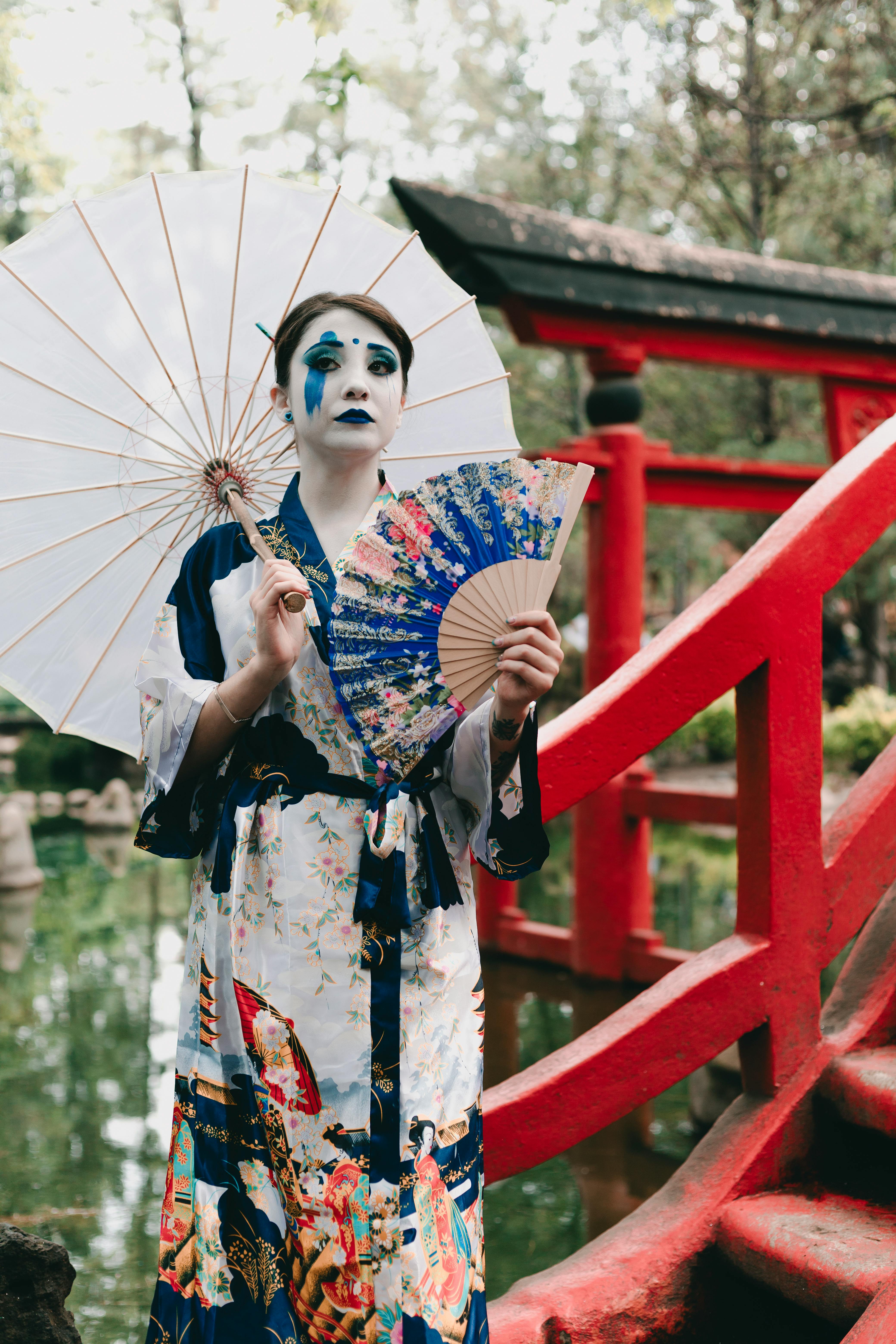 Geisha in Traditional Clothing · Free Stock Photo