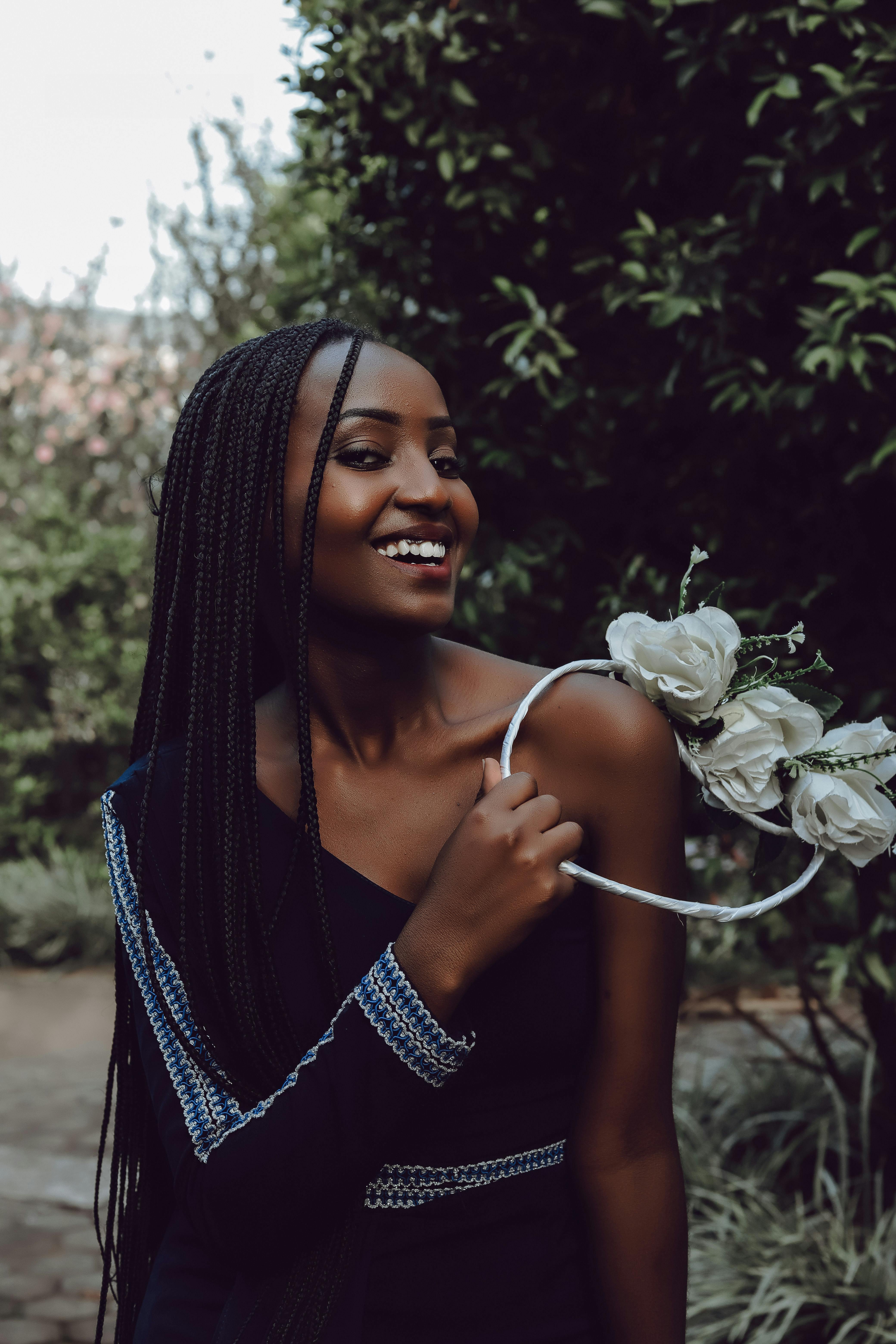 1. Embracing the beauty of nature and individuality, she stands as a symbol of strength and ...