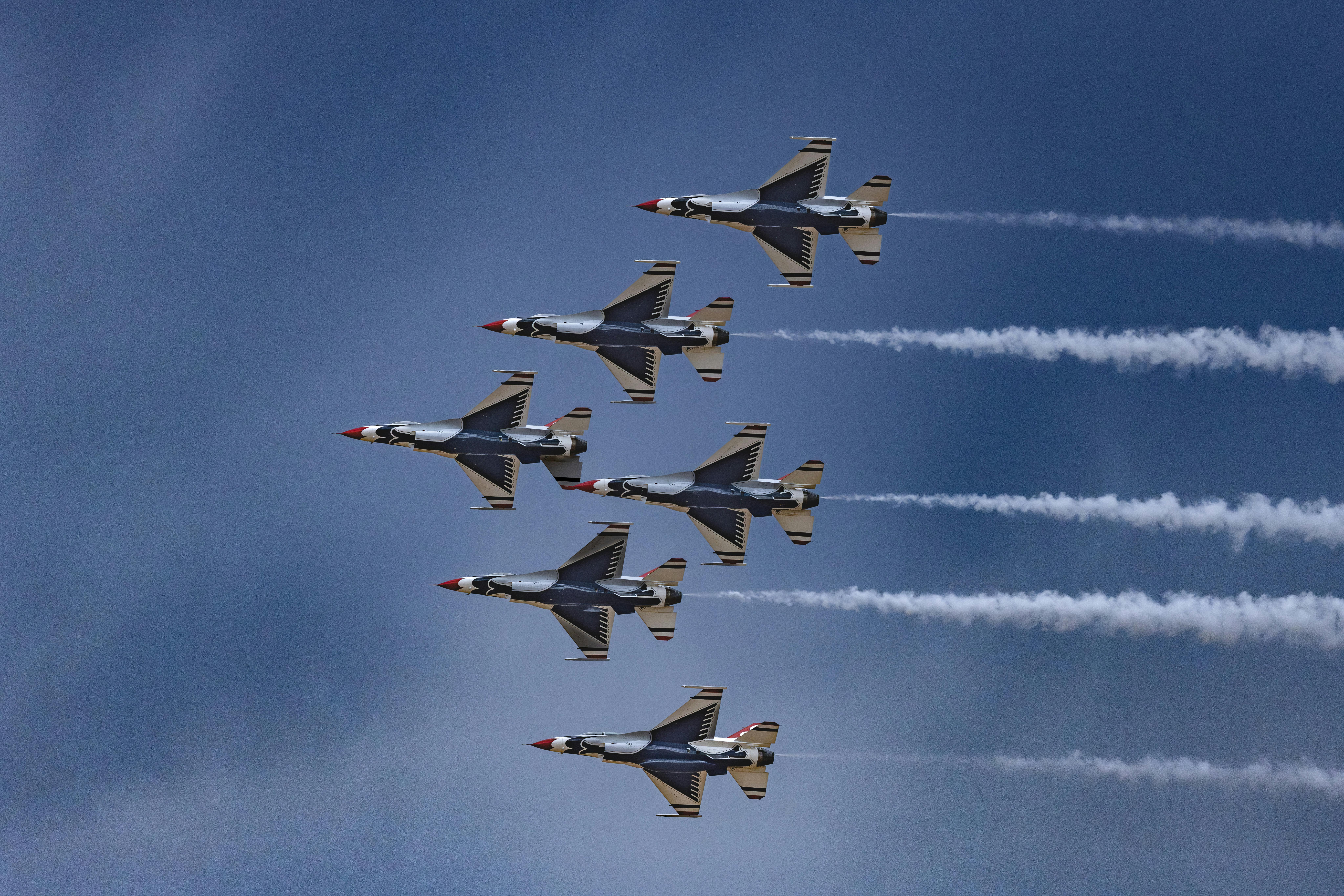 A group of fighter jets flying in formation · Free Stock Photo