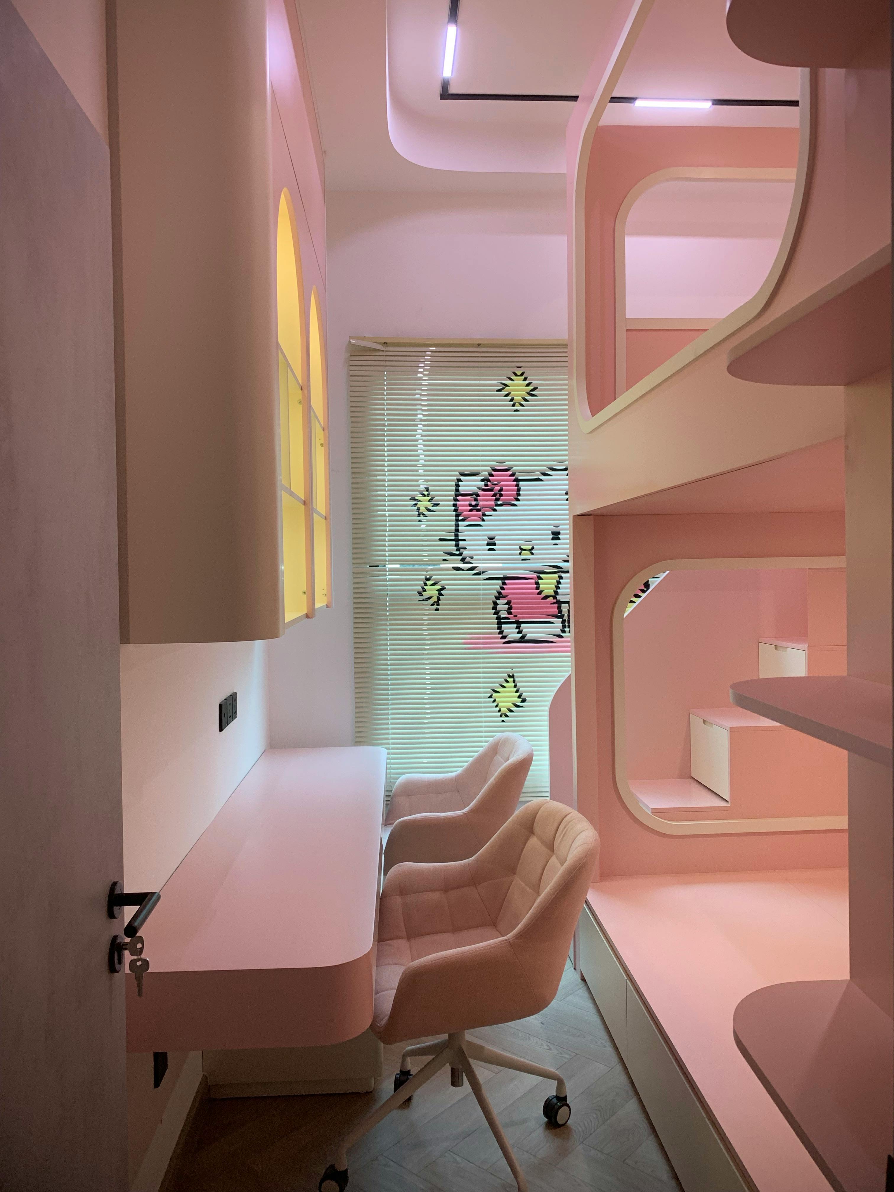 Hello kitty room with pink walls and a desk · Free Stock Photo