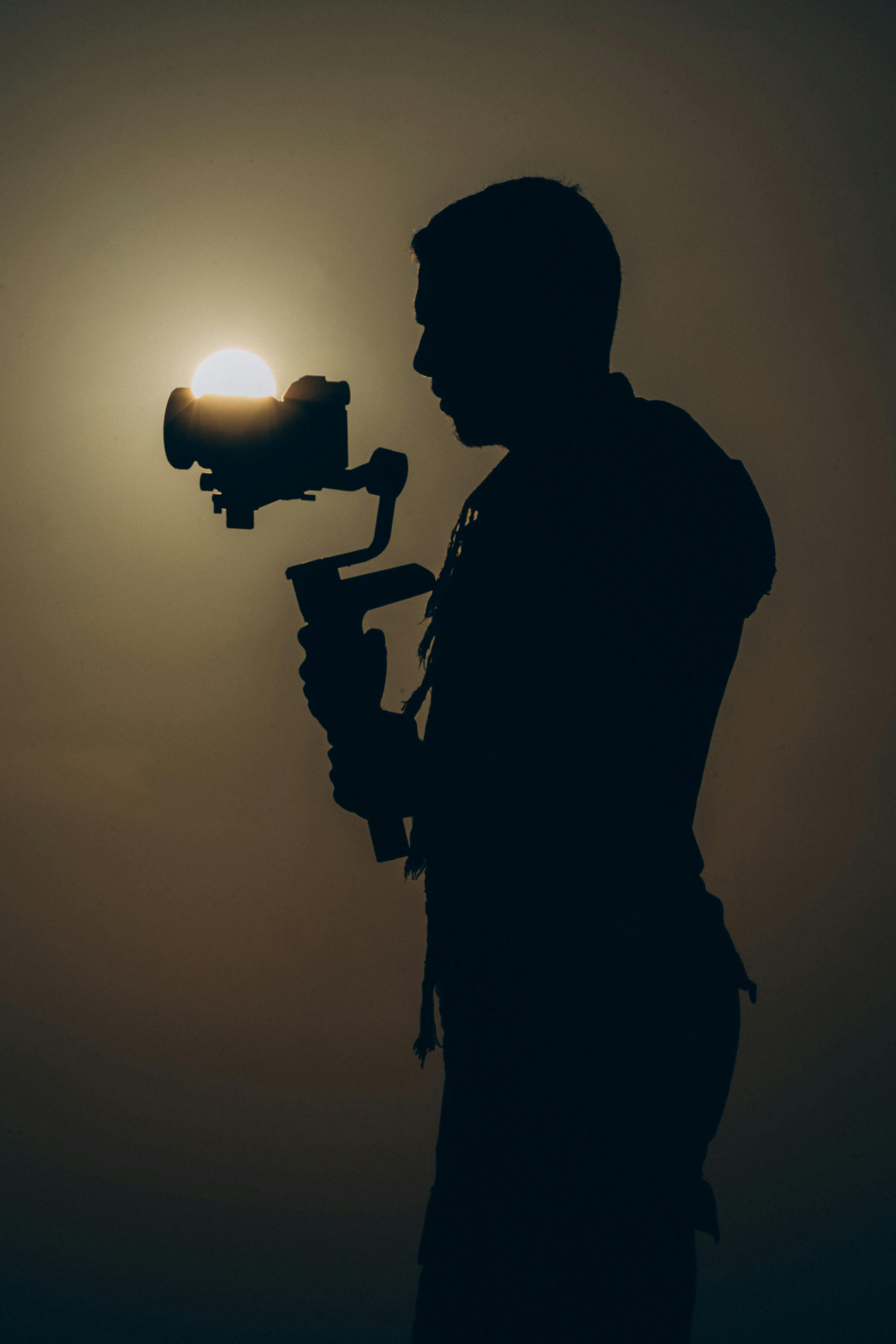 silhouette with camera · Free Stock Photo