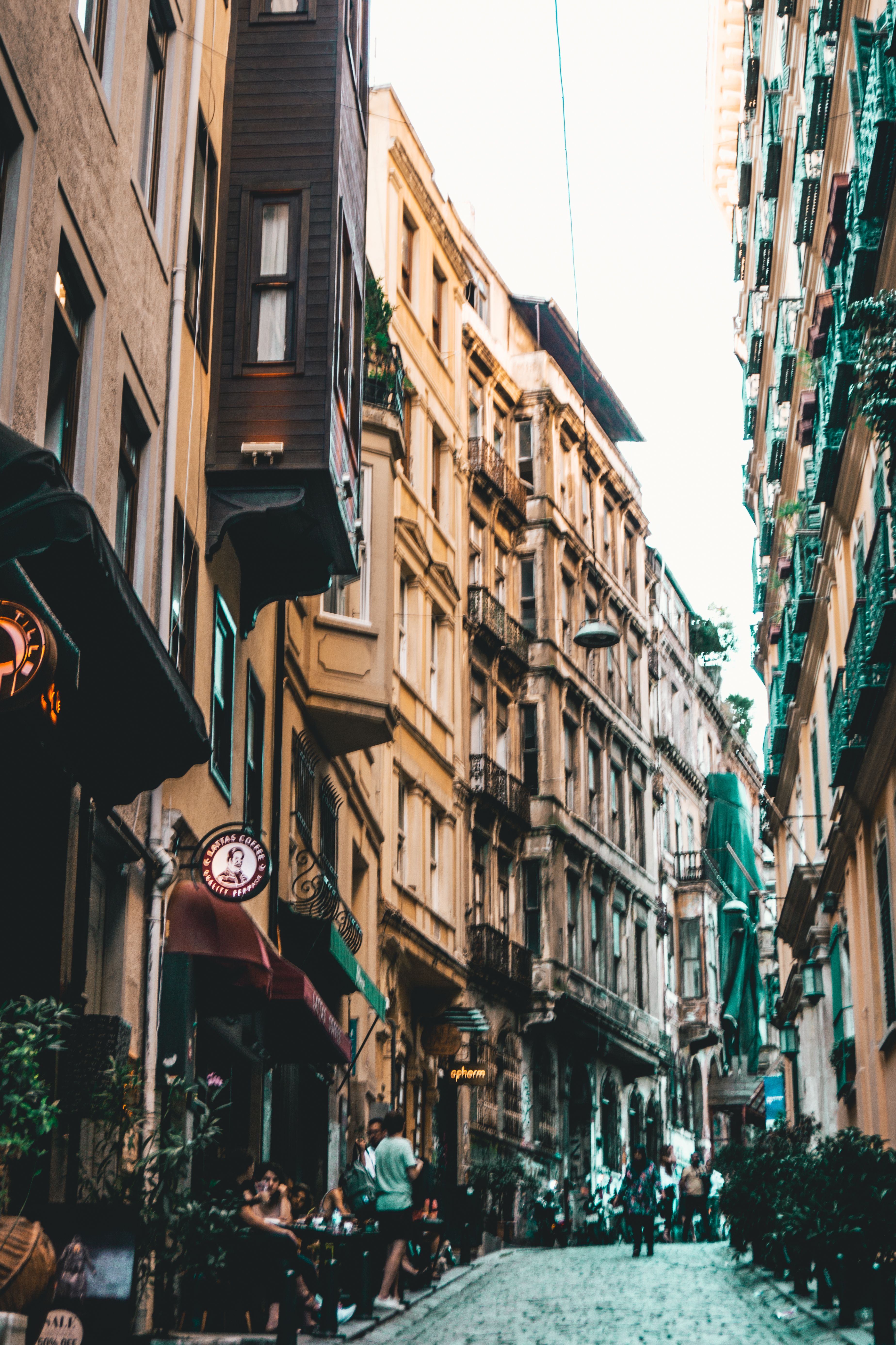 People Beside the Road and Buildings during Day · Free Stock Photo