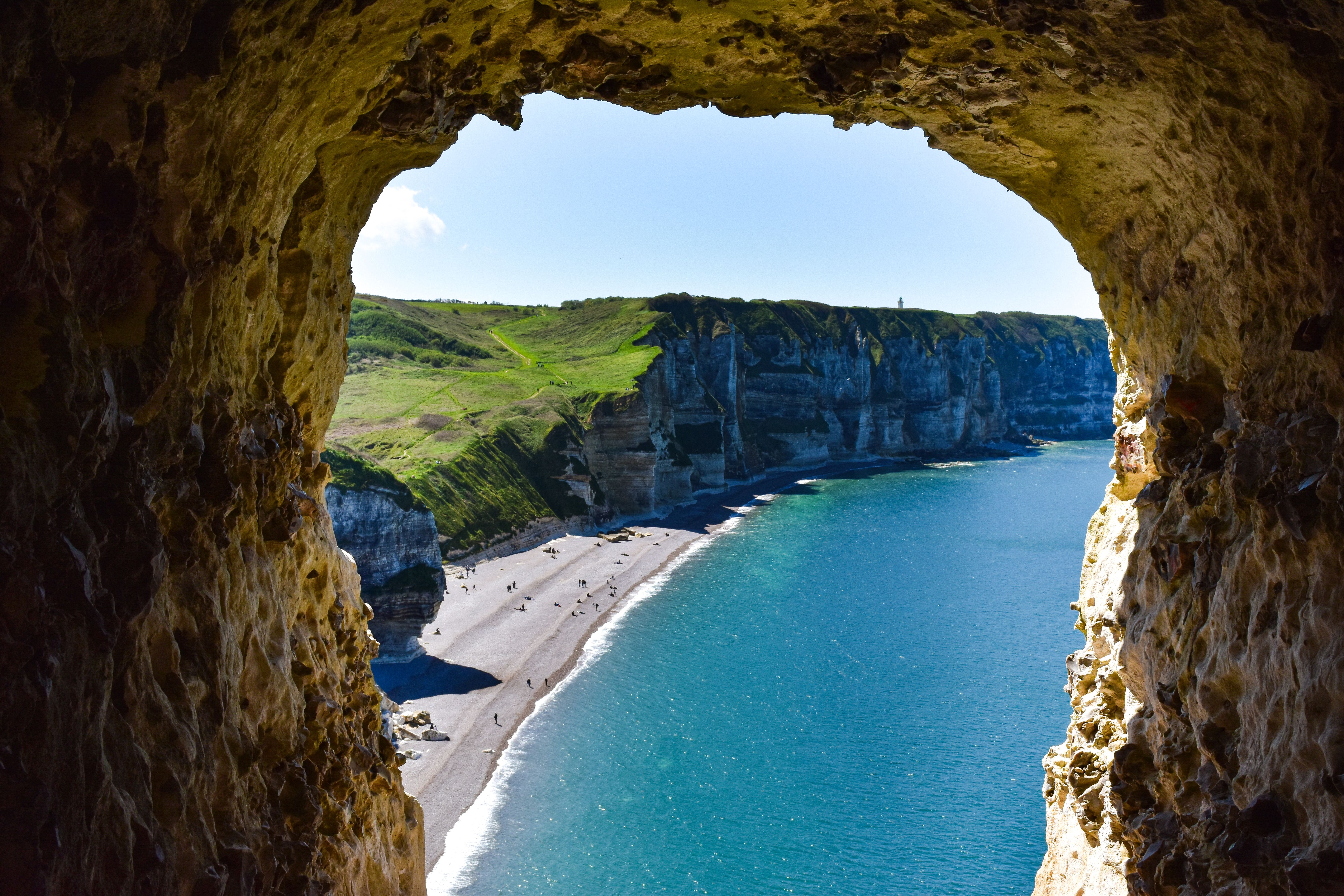 A view of the ocean from a cave · Free Stock Photo