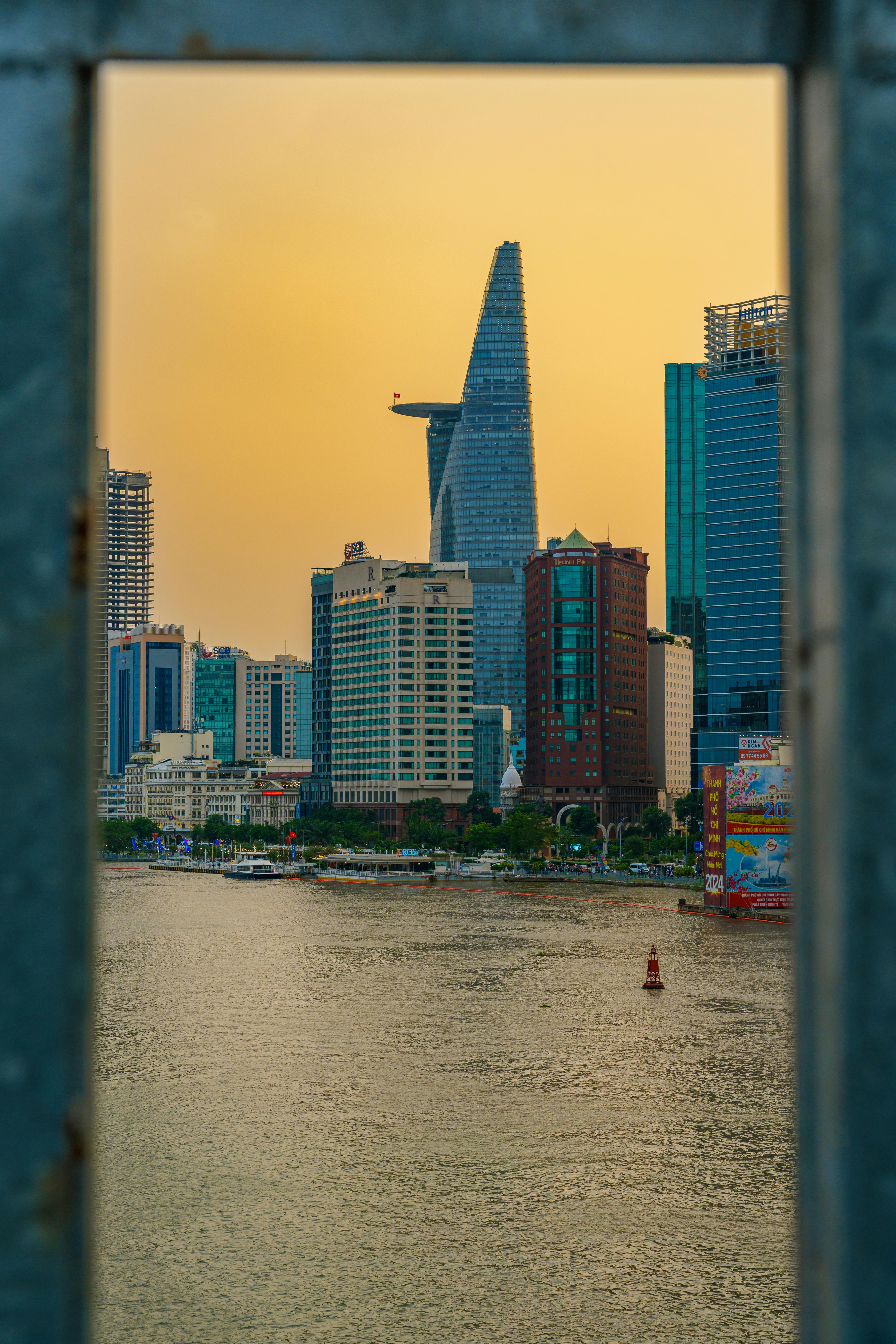 Bitexco Tower: Mesmerizing Sunset Glow in the Afternoon · Free Stock Photo