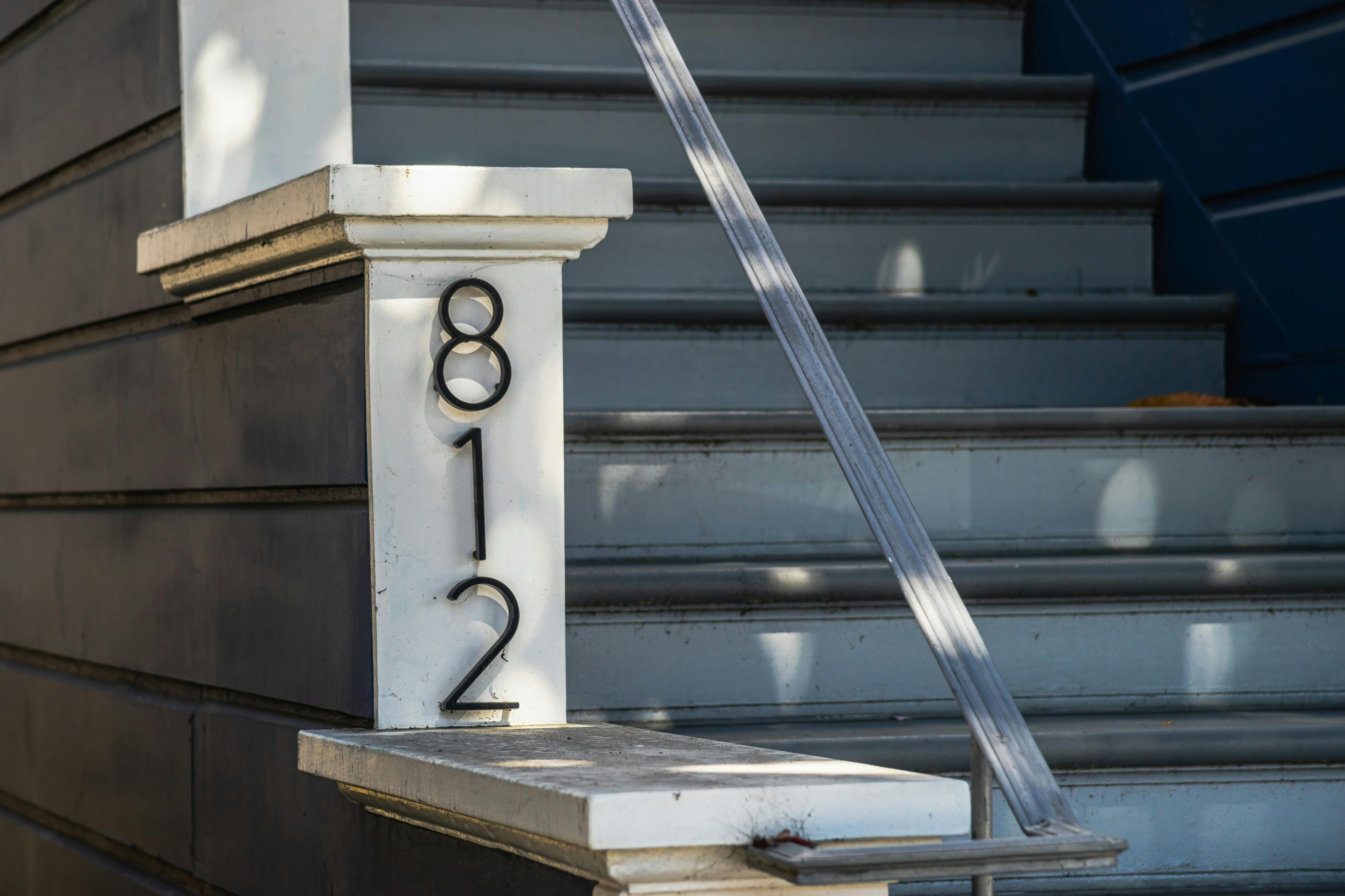 A number sign on the steps of a house · Free Stock Photo