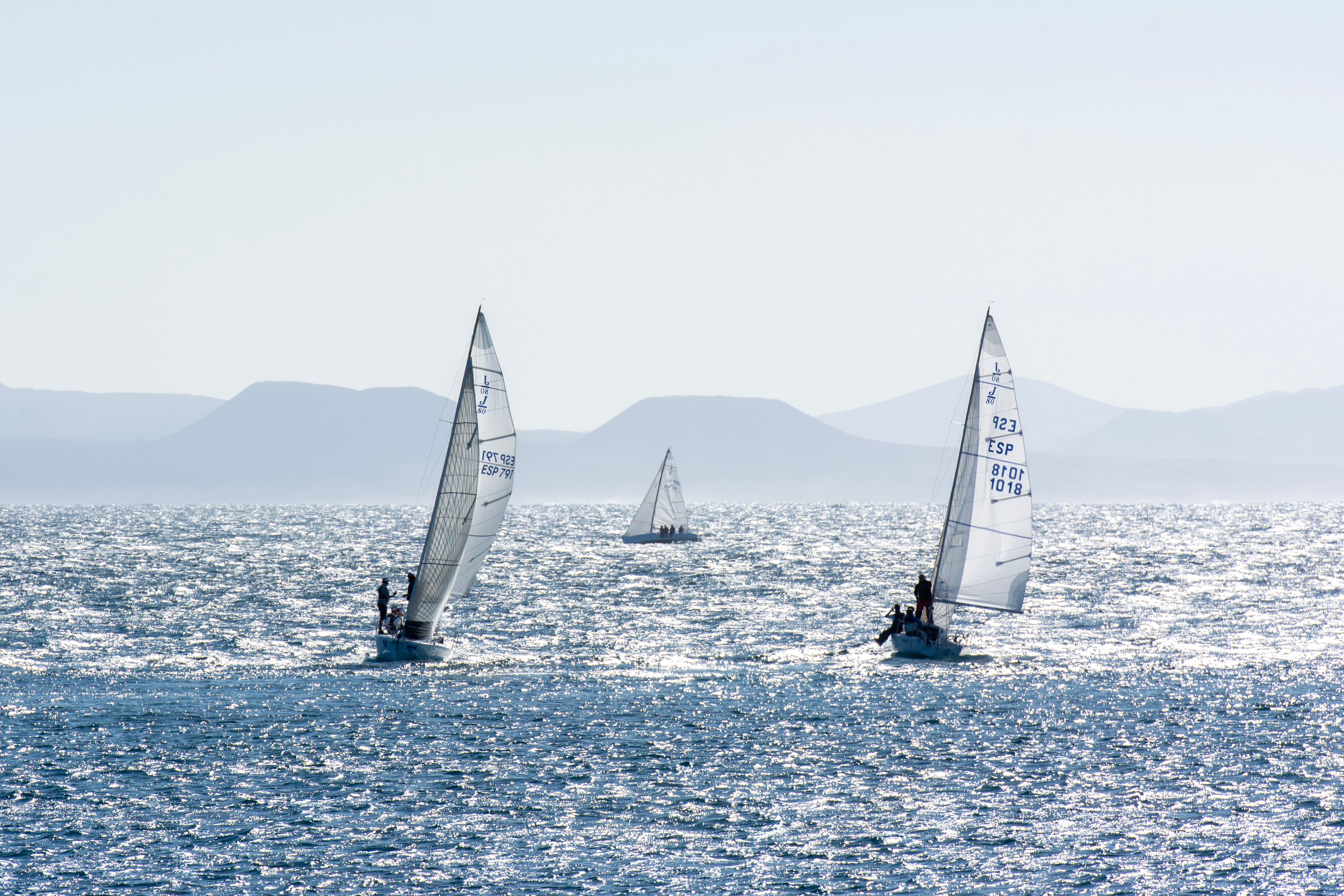Two sailboats are sailing in the ocean · Free Stock Photo