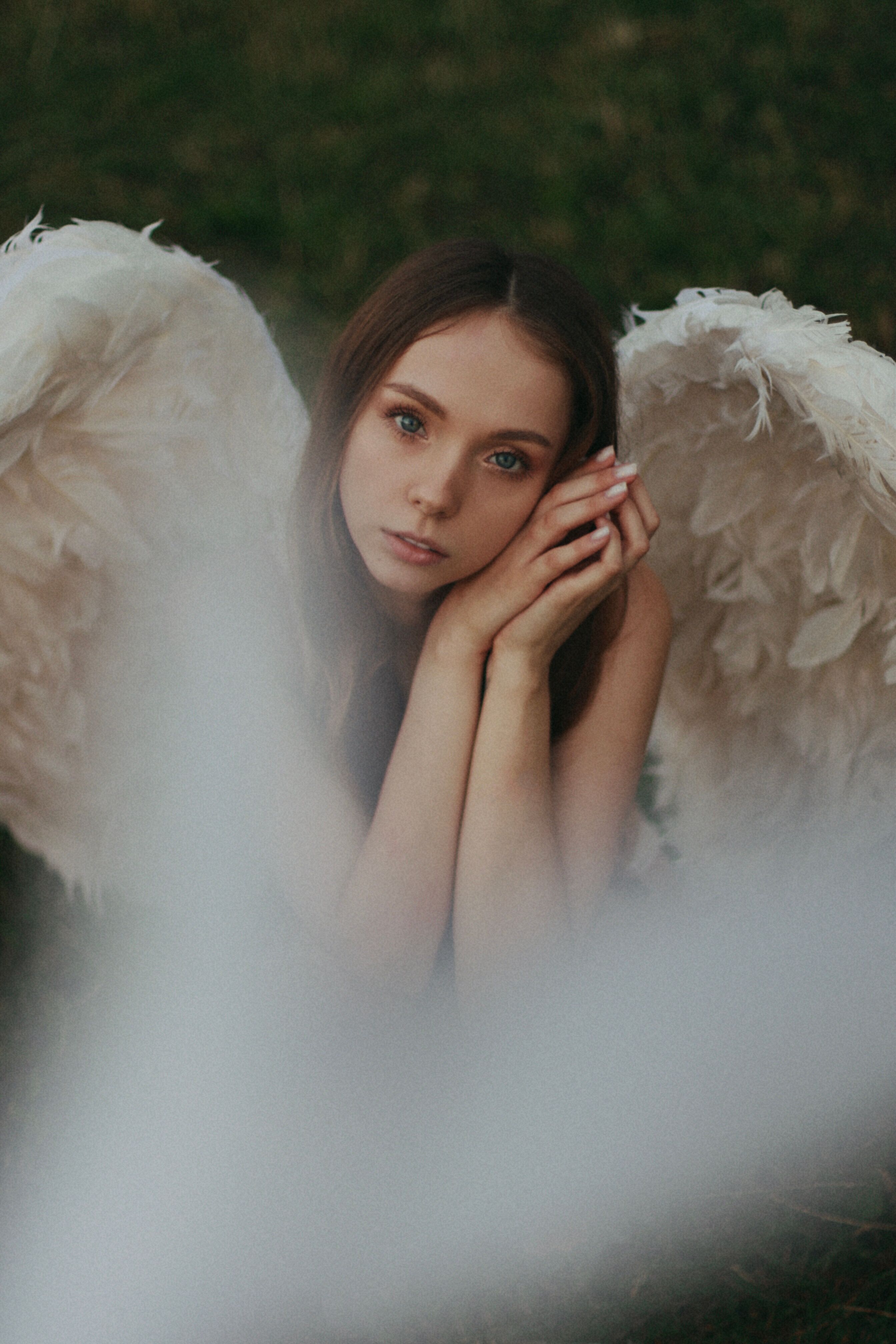 Serene Angelic Portrait in Outdoor Setting · Free Stock Photo