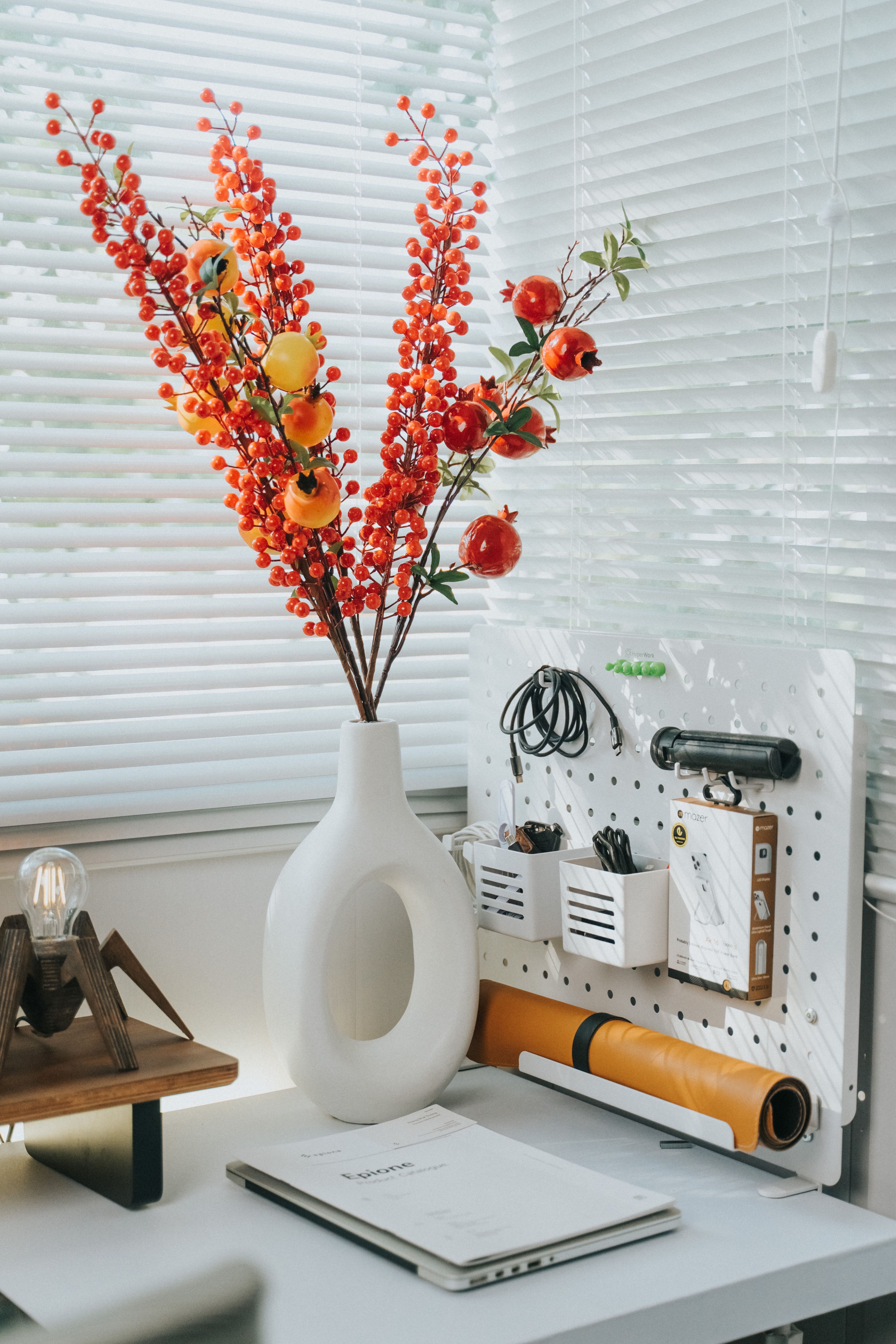 A Vase with a Flower Arrangement on the Desk · Free Stock Photo