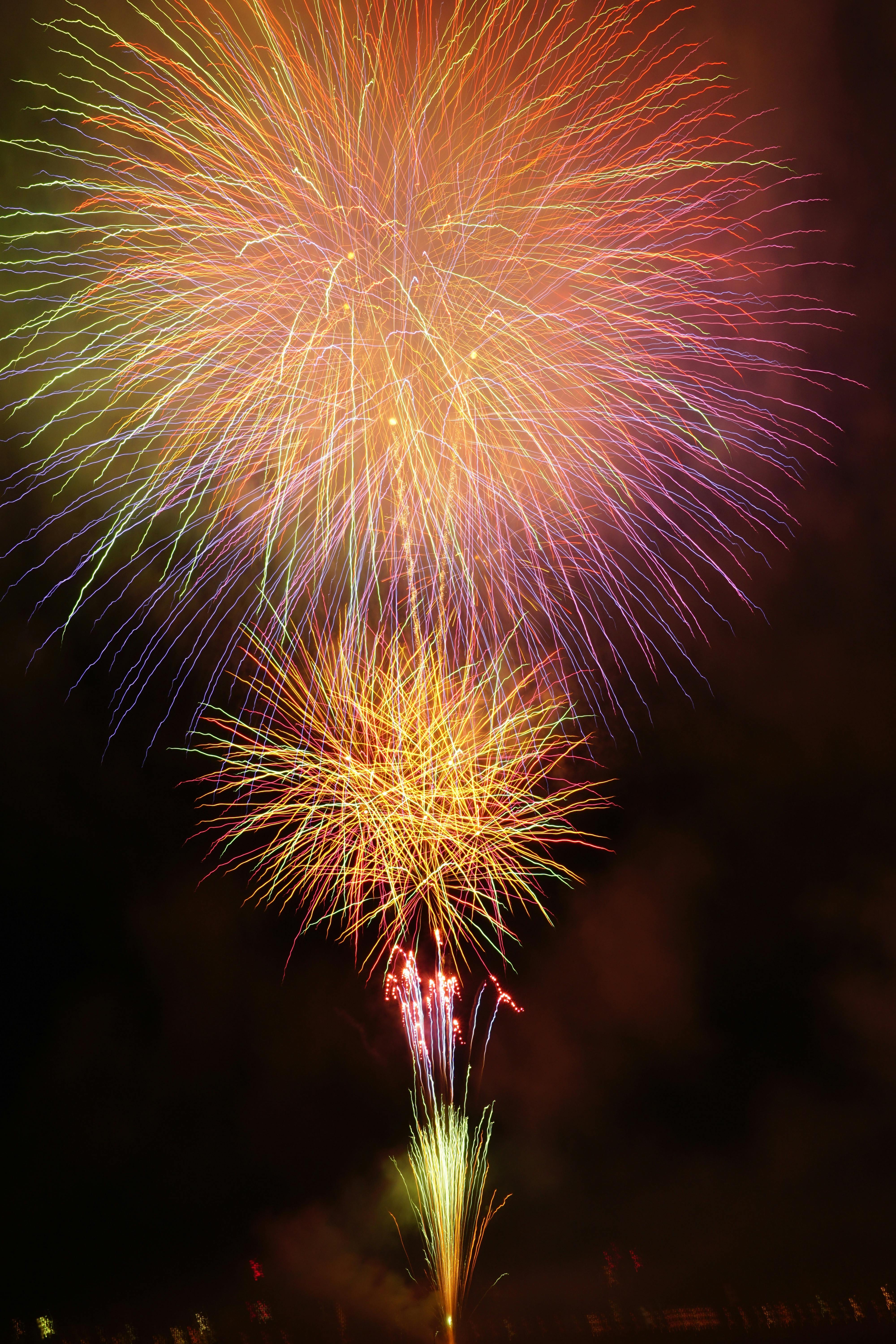 Fireworks in the sky over a dark background · Free Stock Photo