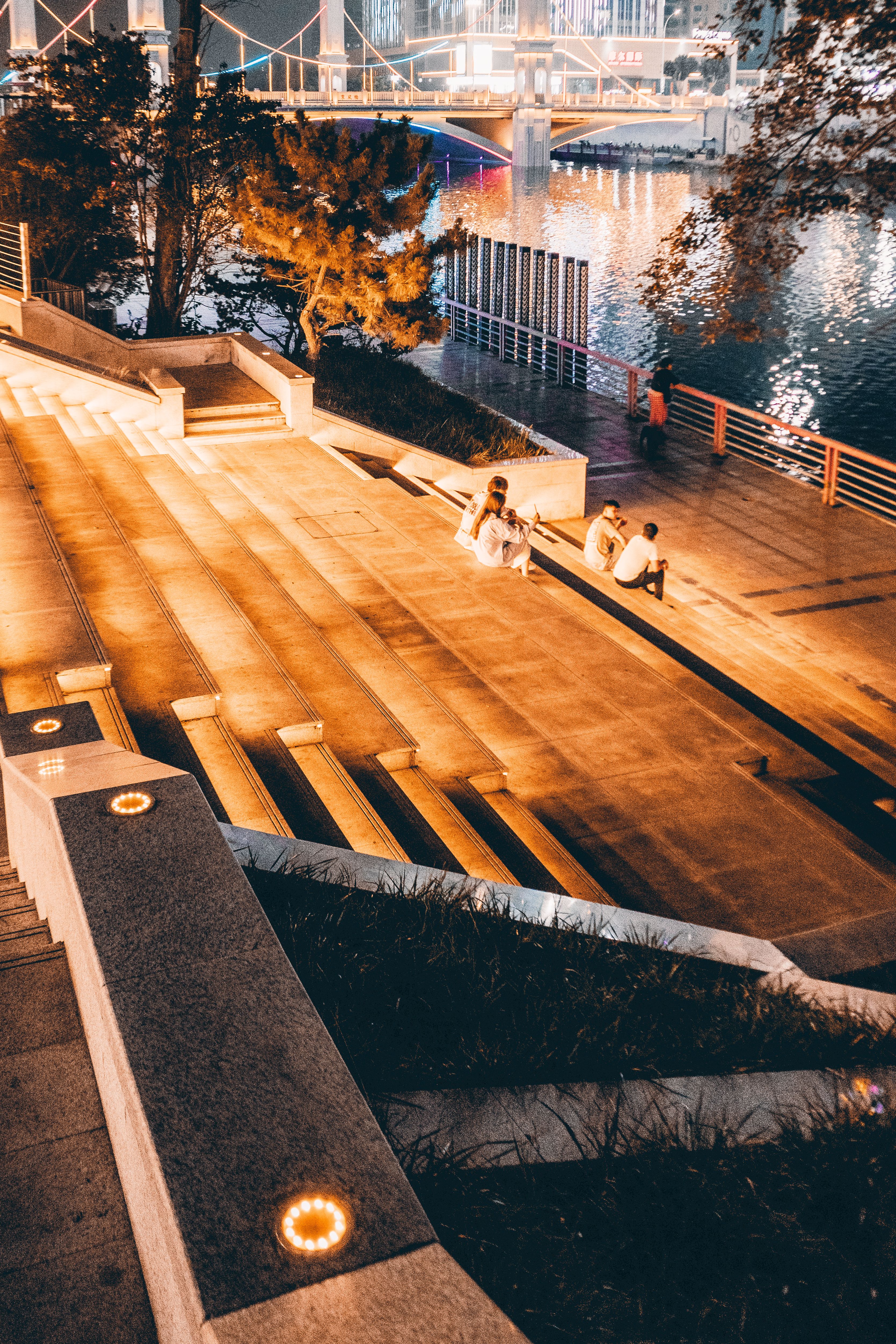 A cityscape with stairs and a river · Free Stock Photo