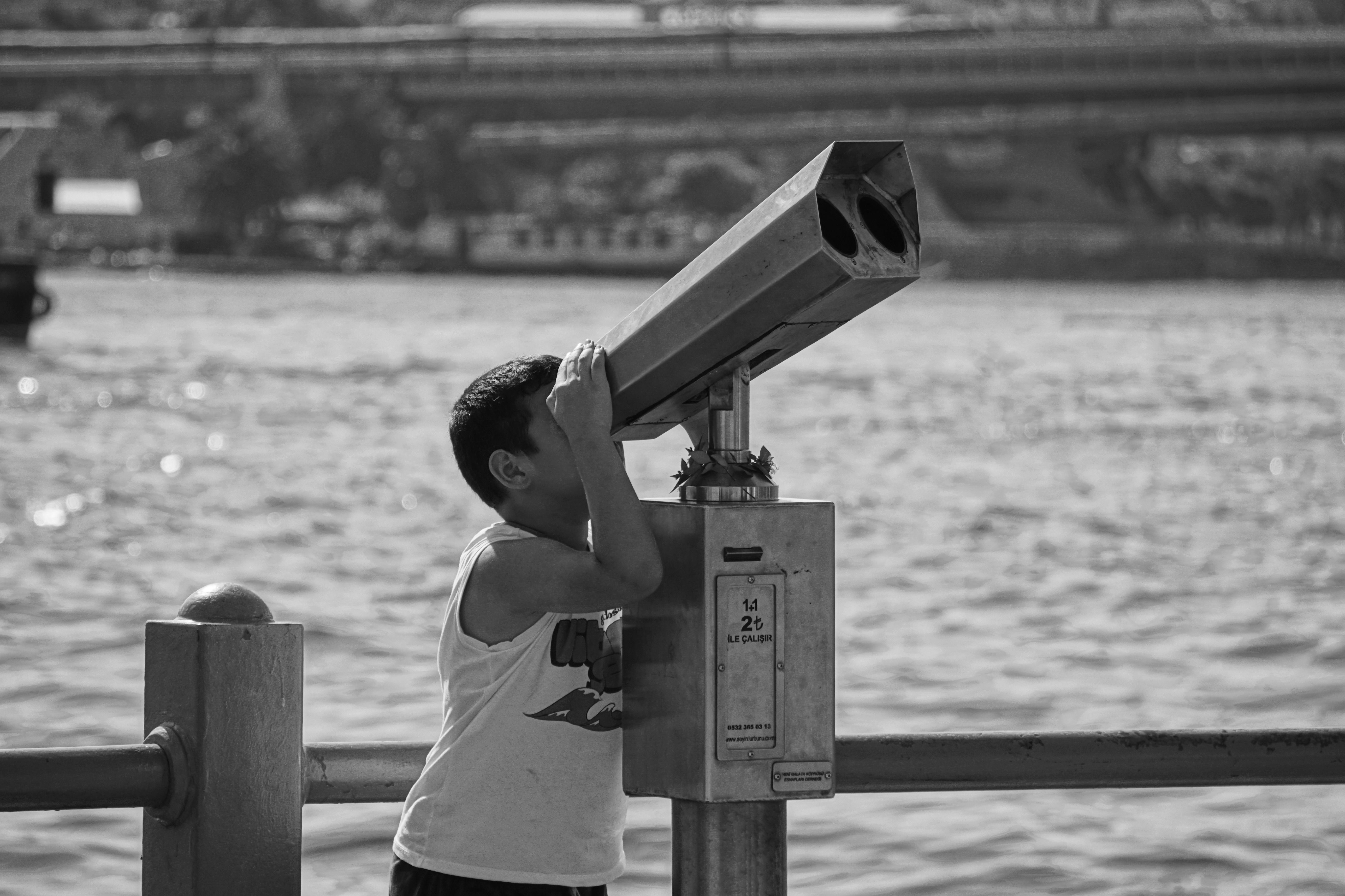 Man Looking in Binoculars during Sunset · Free Stock Photo