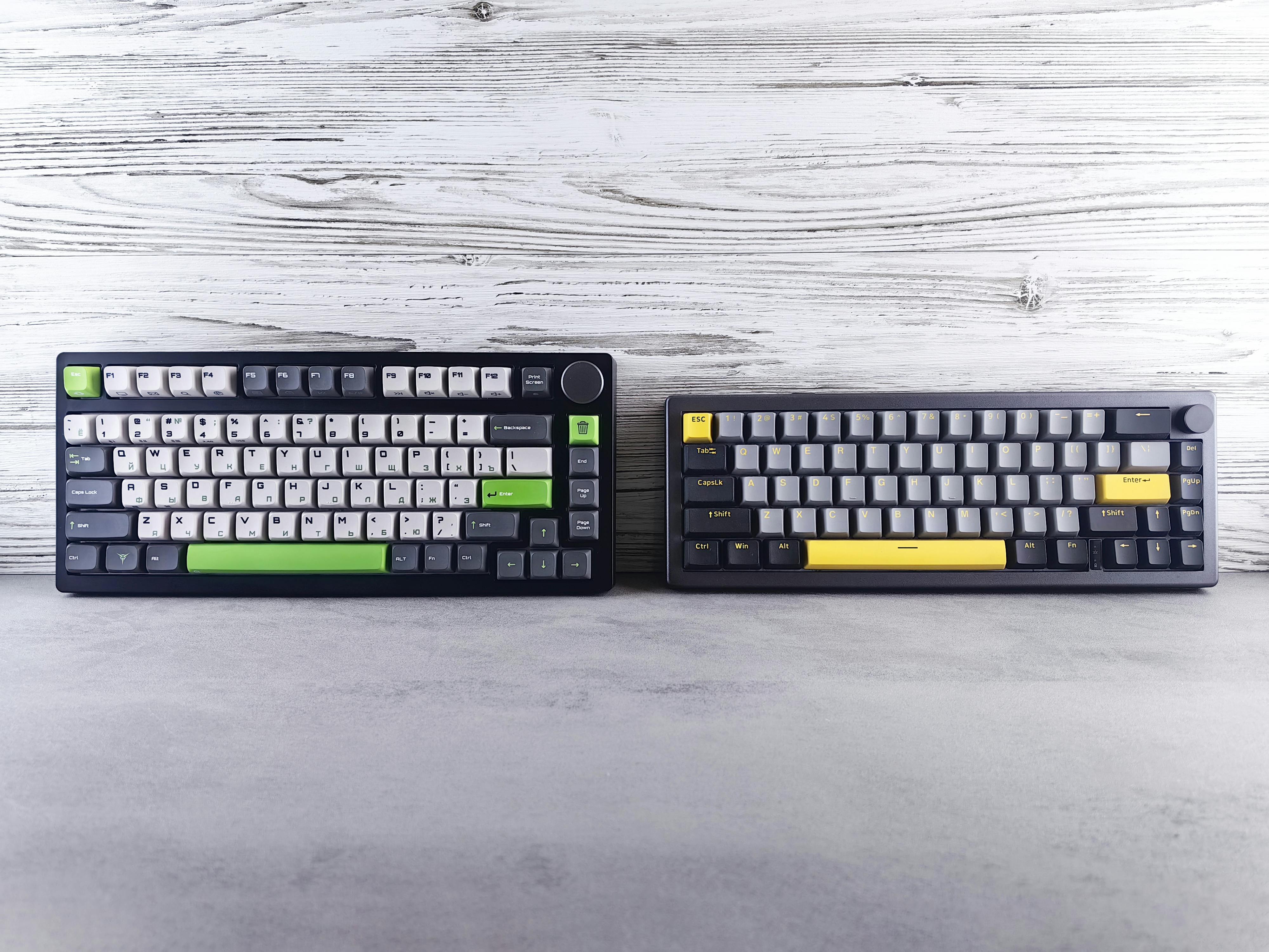 Two black and yellow keyboards sitting next to each other · Free Stock ...