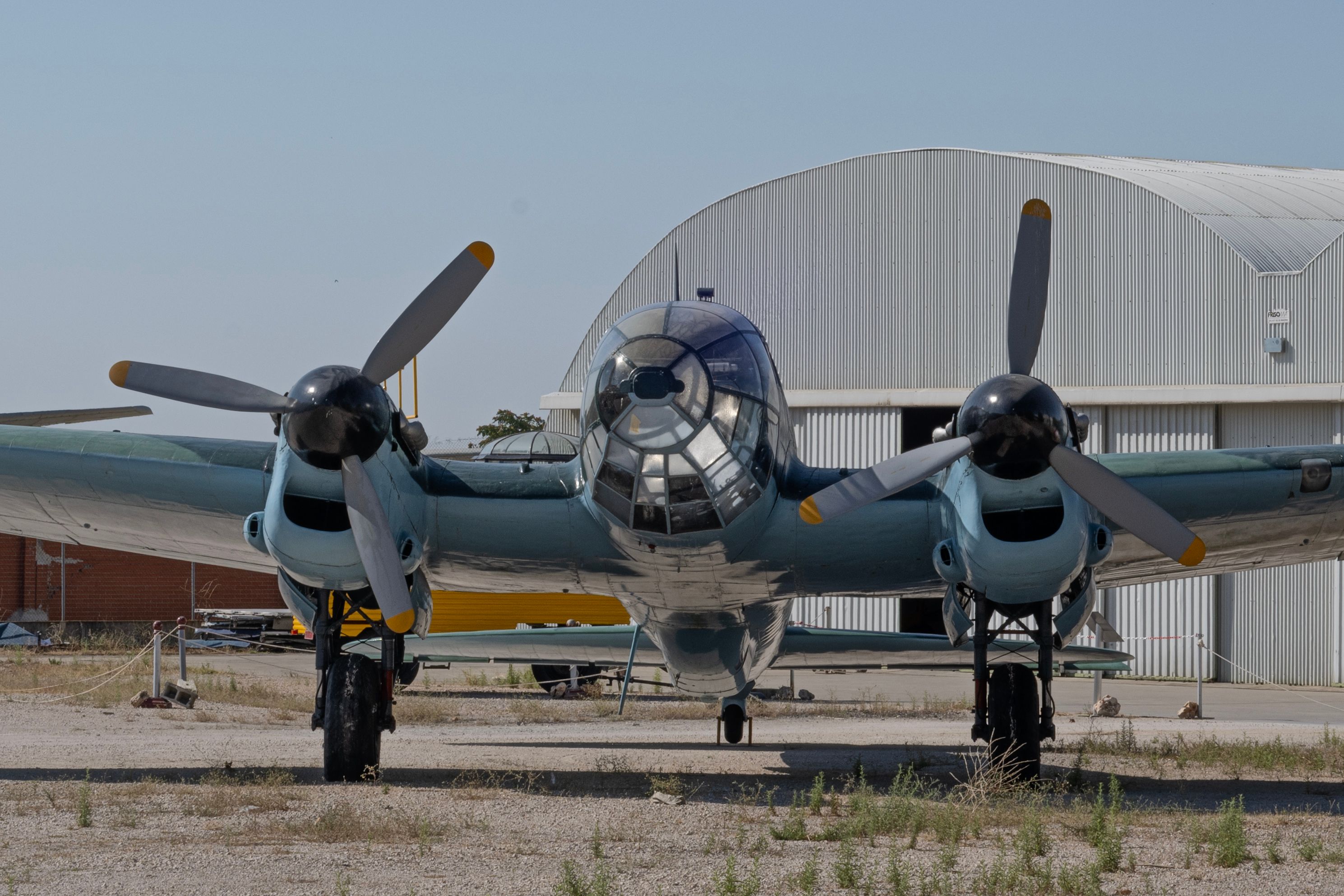 A small propeller plane sitting on a runway · Free Stock Photo