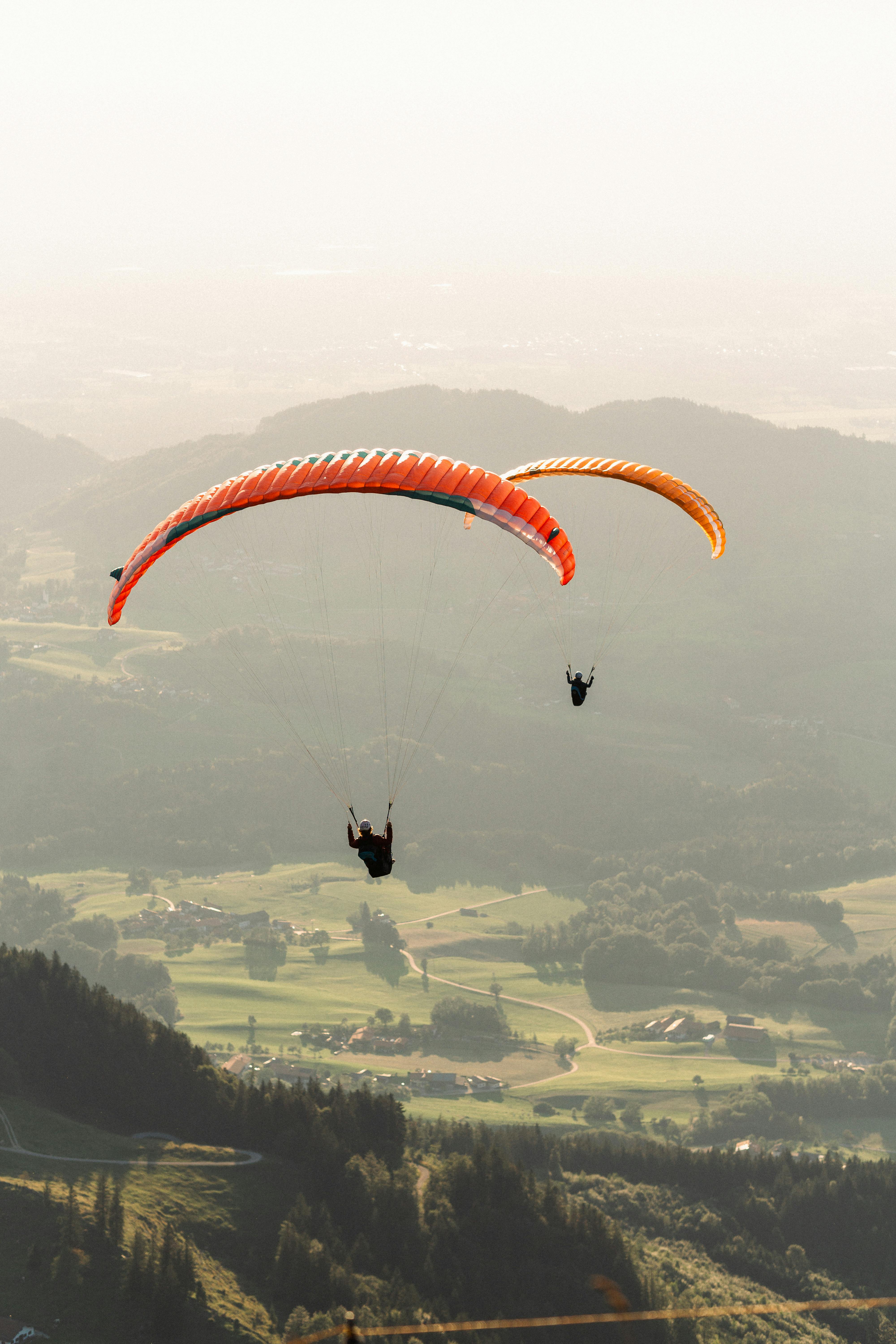 Low Angle View of Paragliding Against Sky · Free Stock Photo