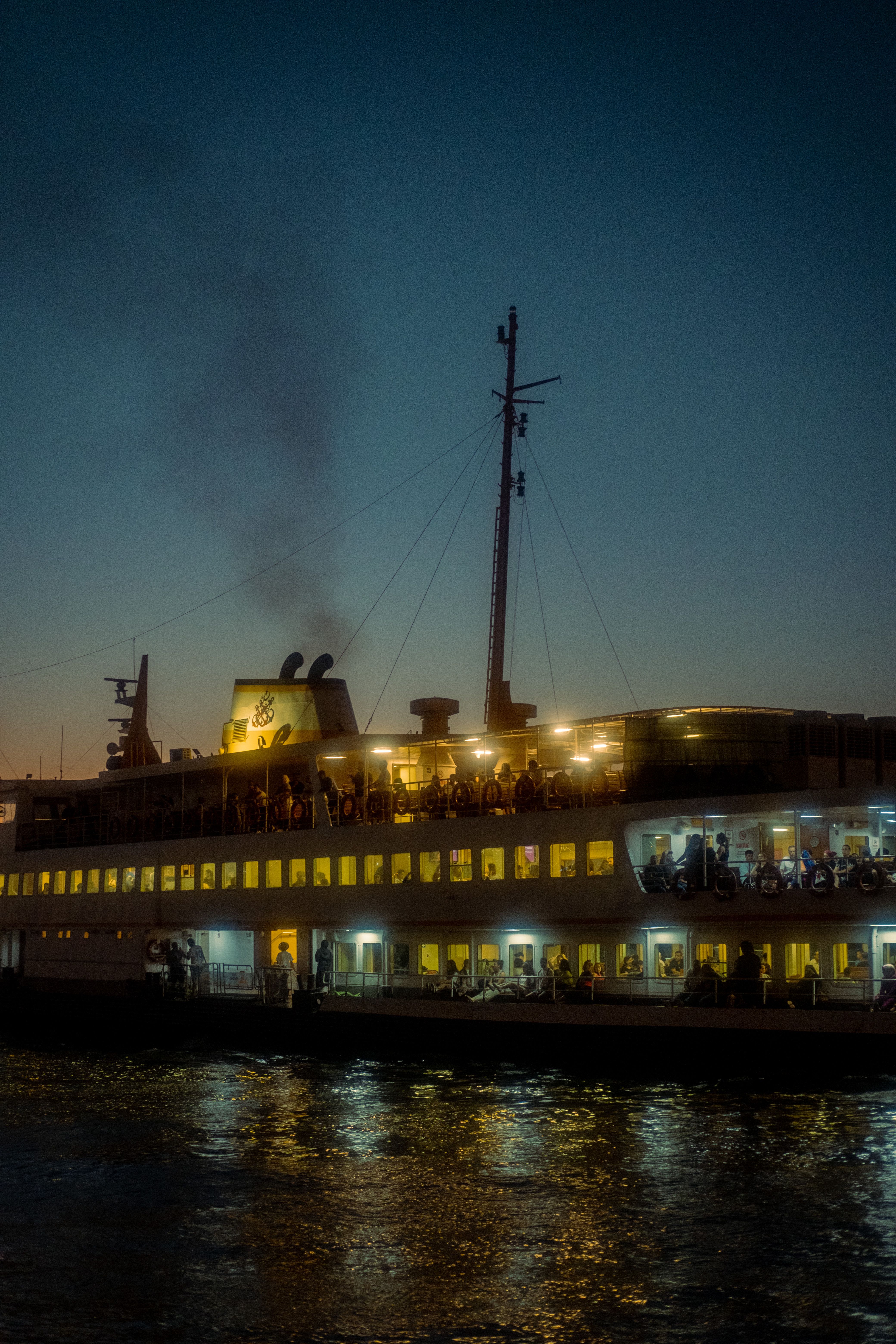 A ferry boat is docked at night · Free Stock Photo