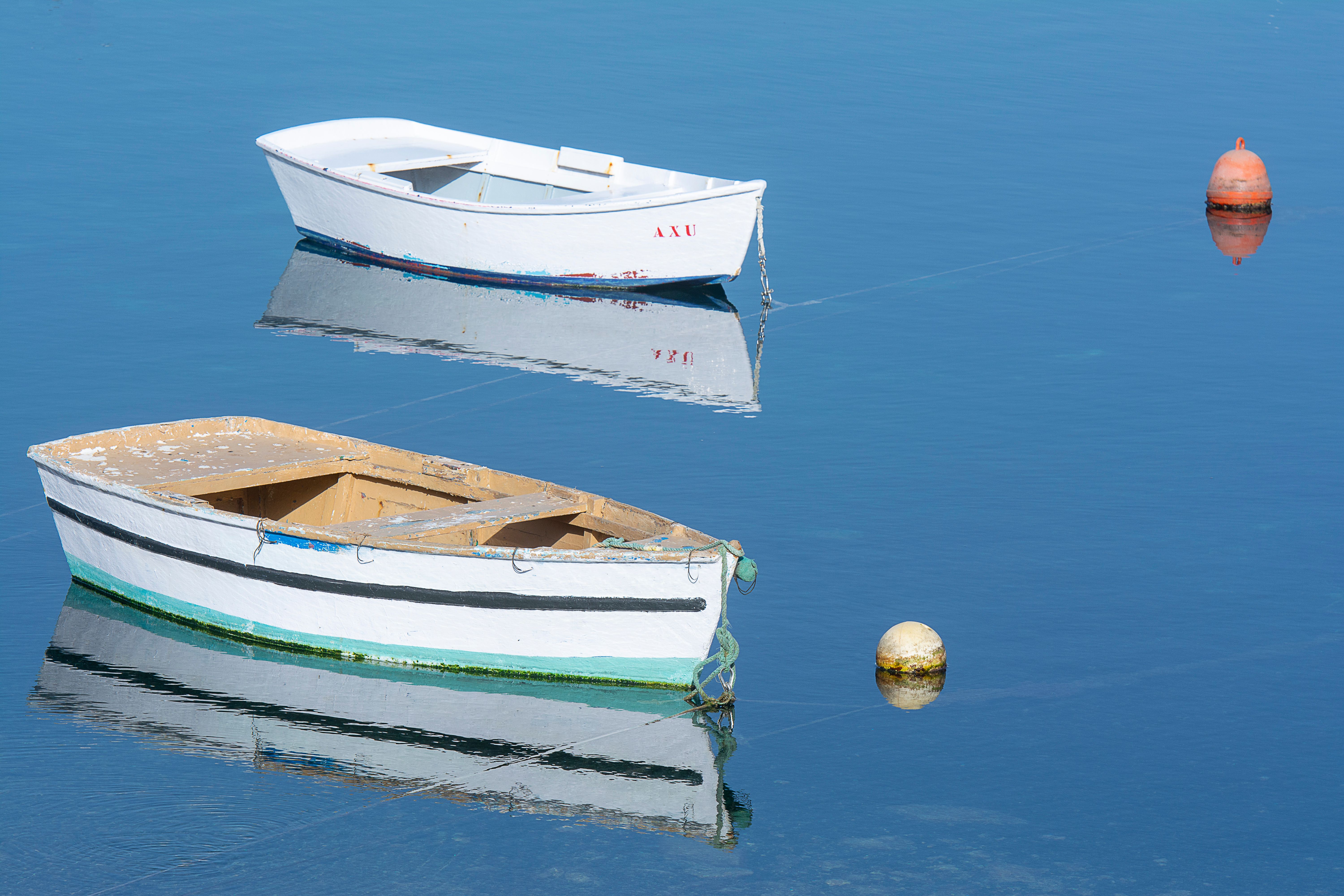 Two boats floating in the water · Free Stock Photo