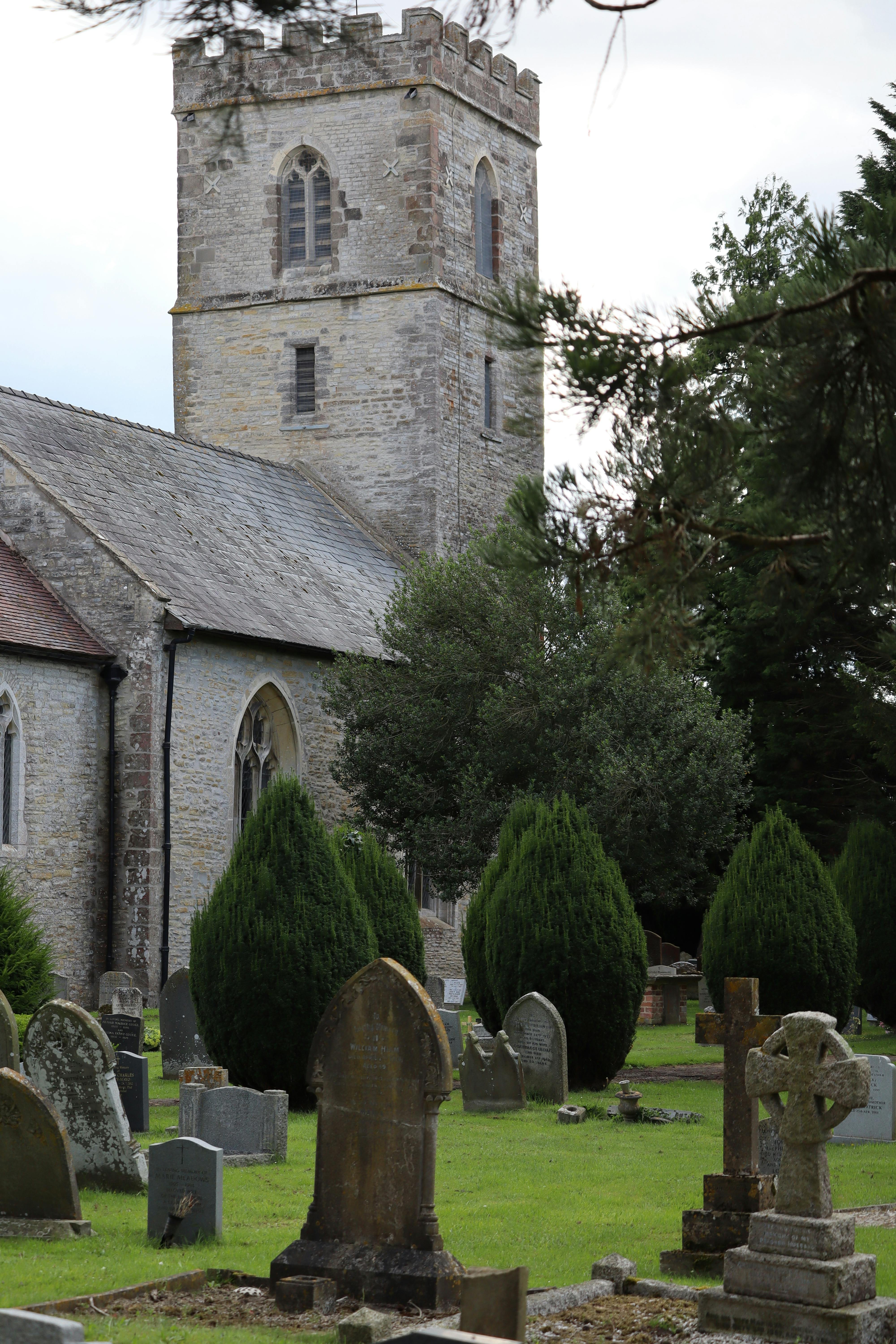 Facade of ancient Anglican church against cloudy sky in autumn · Free ...