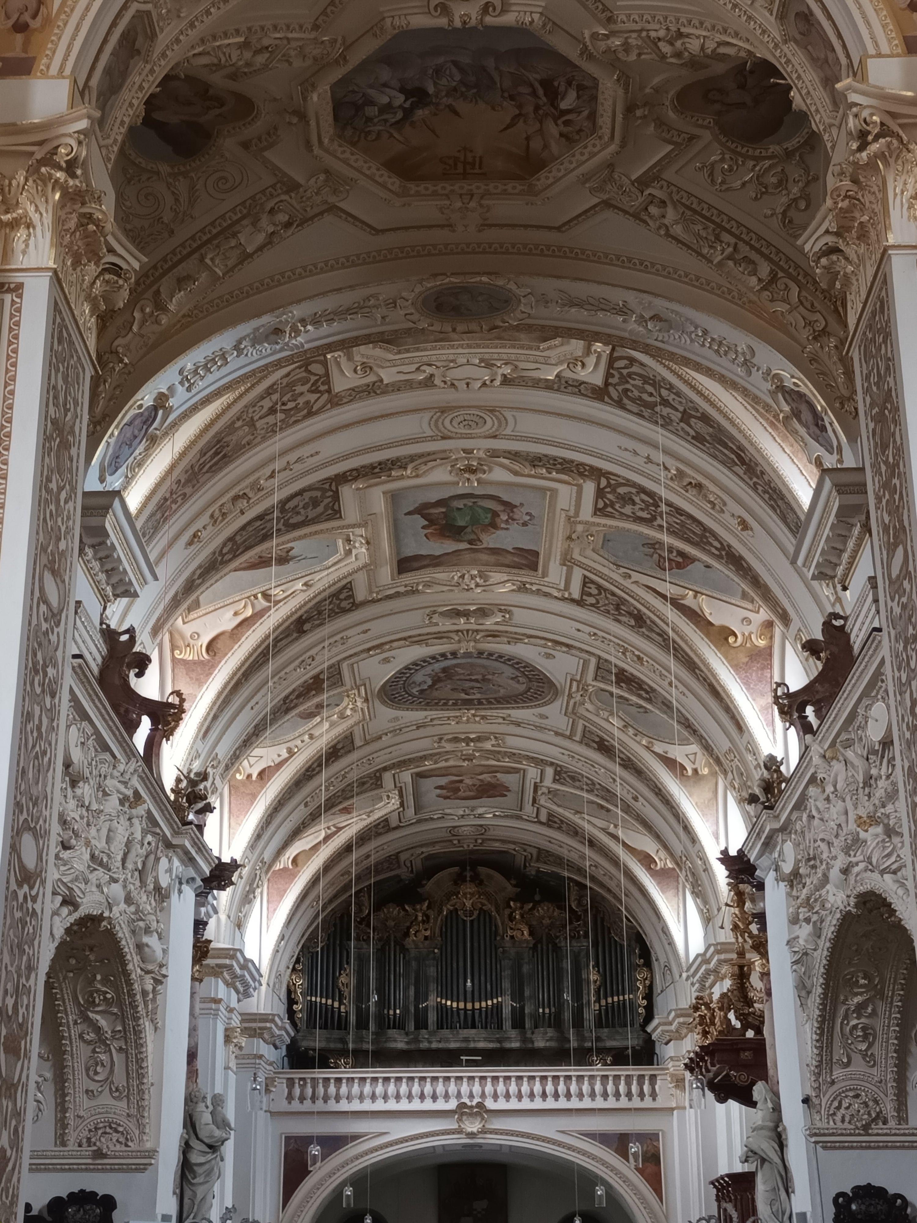 The interior of a church with ornate ceilings · Free Stock Photo