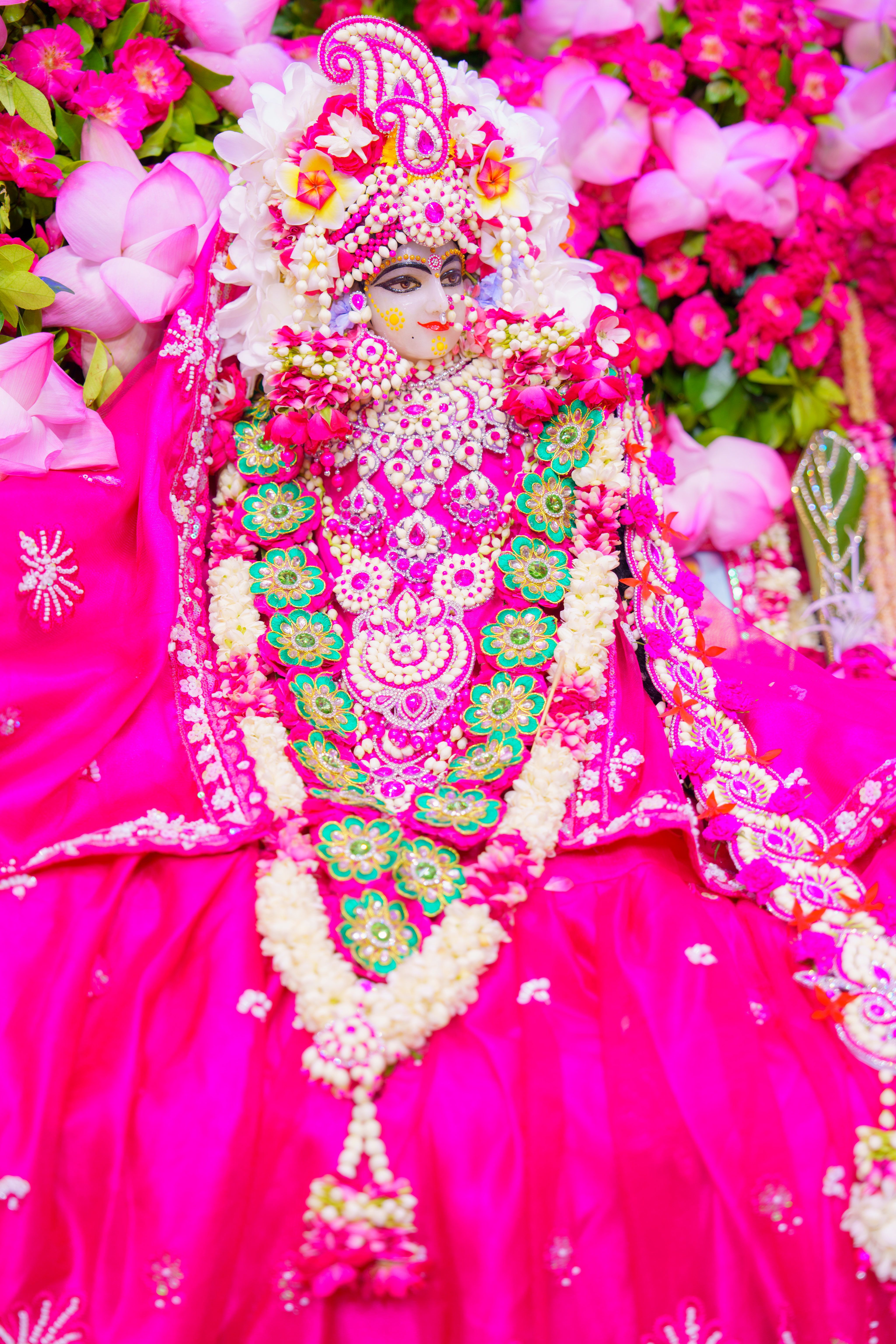 A pink and white statue of lord krishna · Free Stock Photo