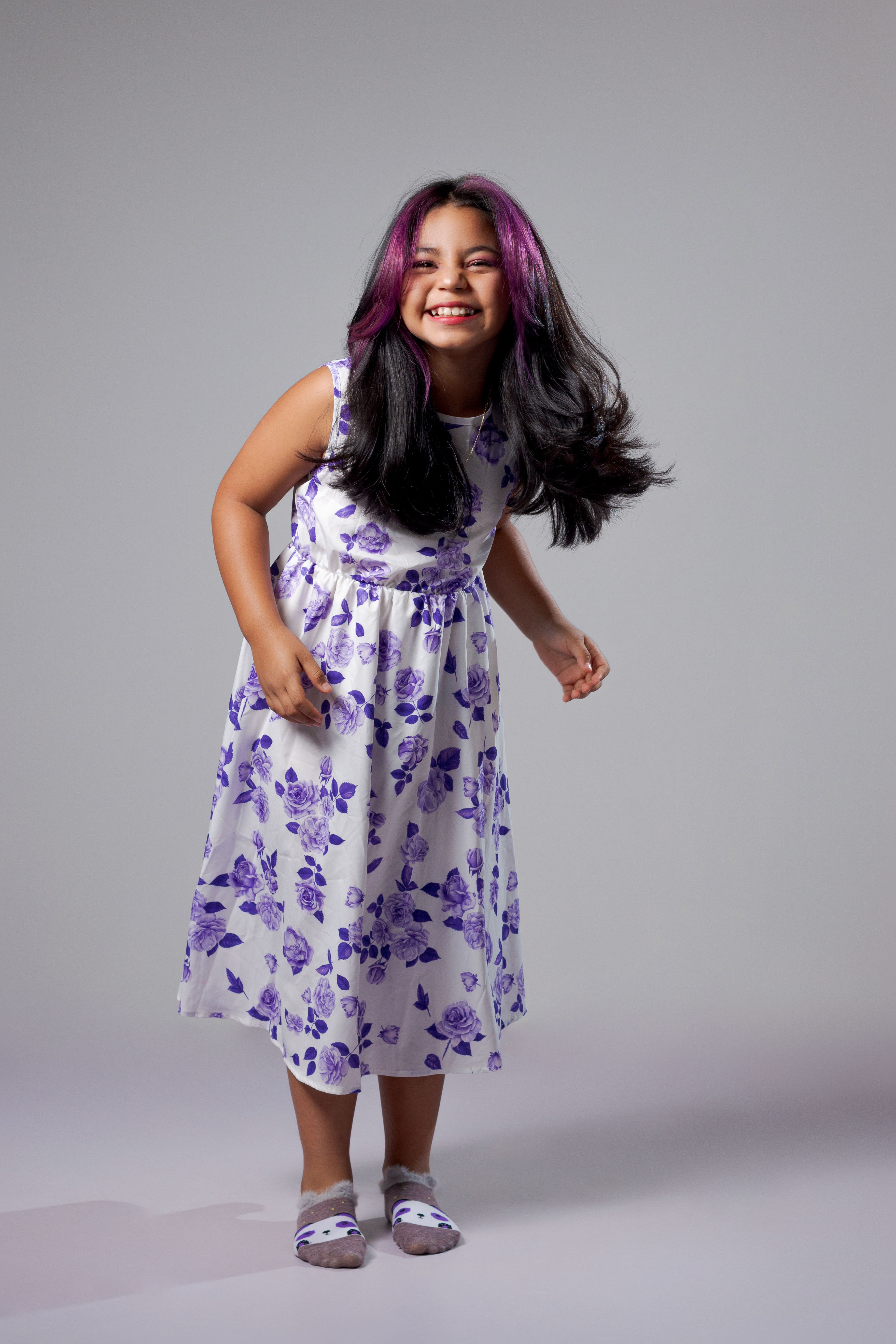 A little girl with purple hair and purple dress · Free Stock Photo