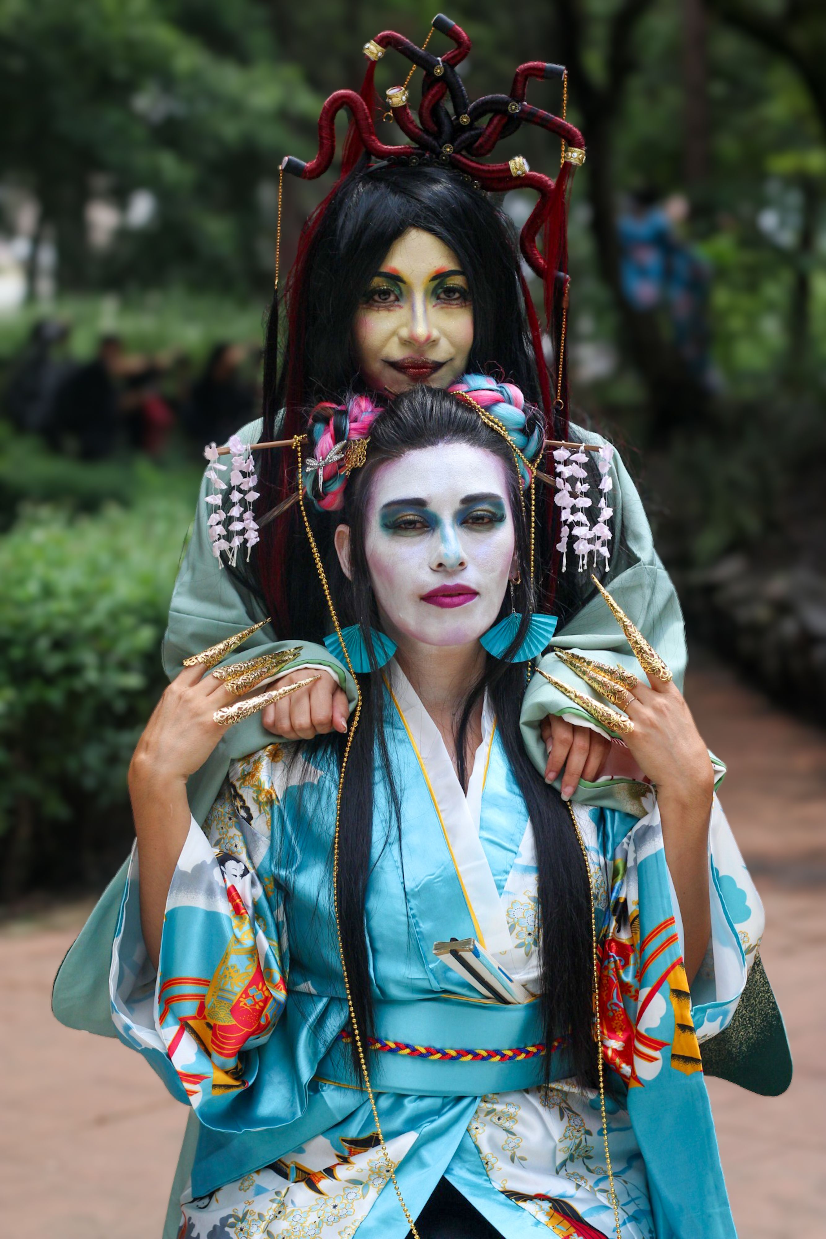 Two women dressed as geisha are sitting on top of each other · Free ...
