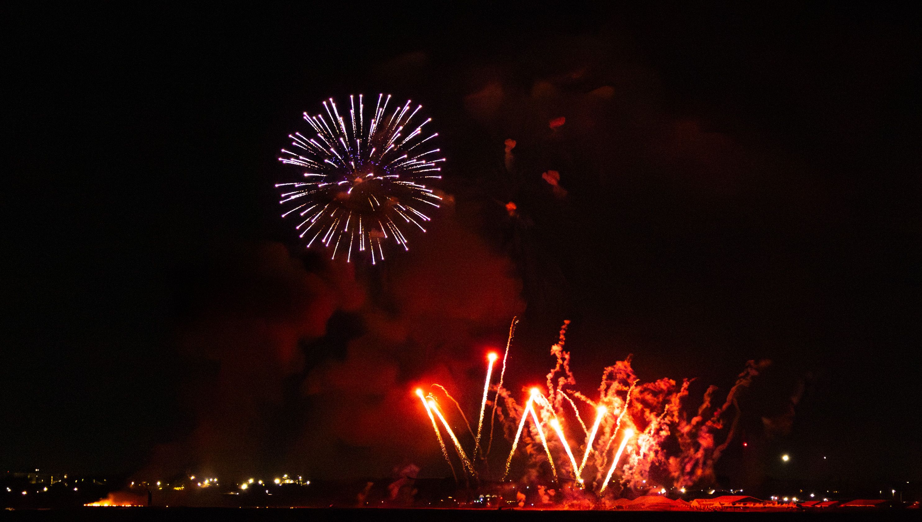 Fireworks are lit up in the night sky · Free Stock Photo