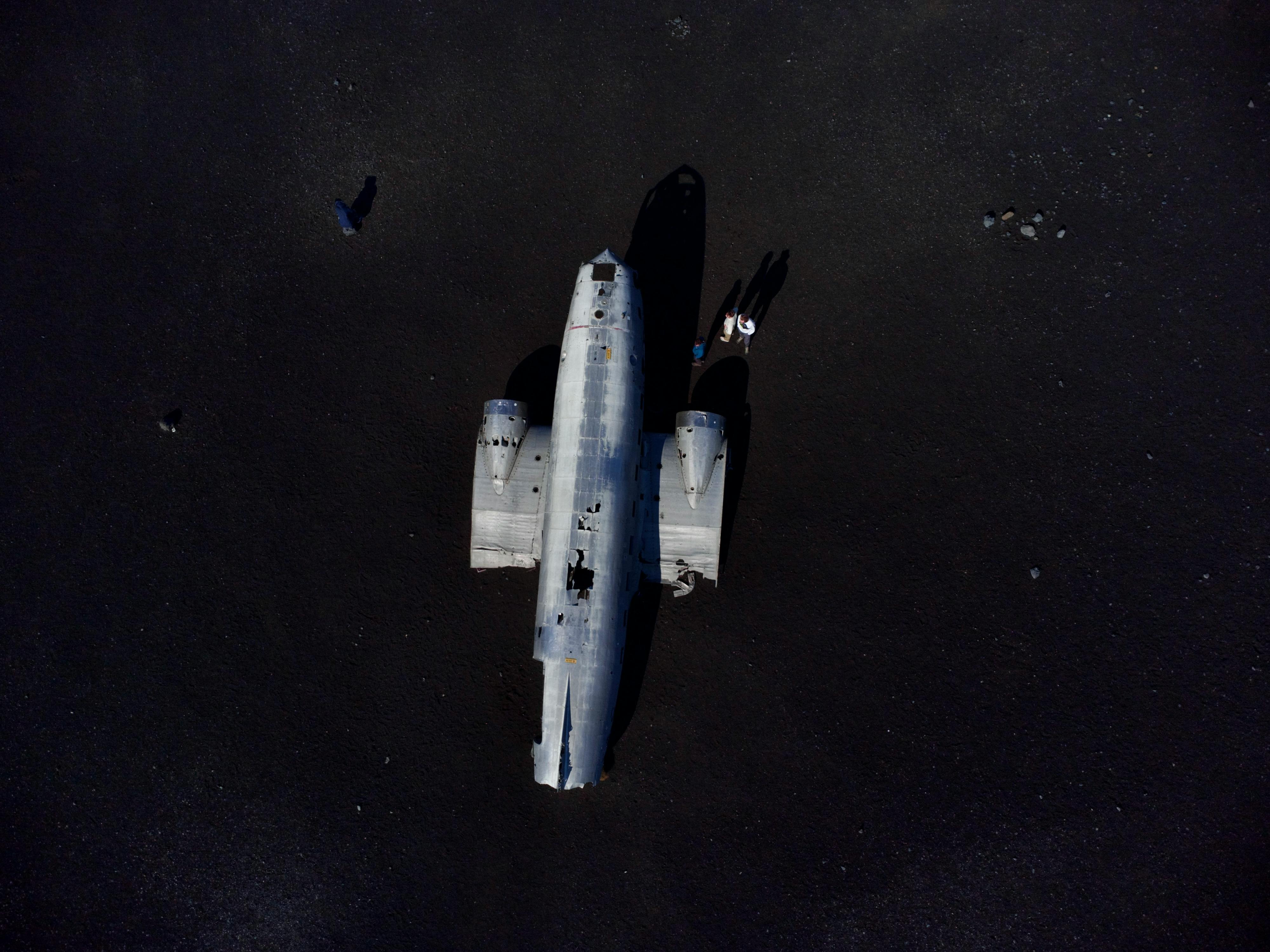 Person Standing on Wrecked Plane · Free Stock Photo