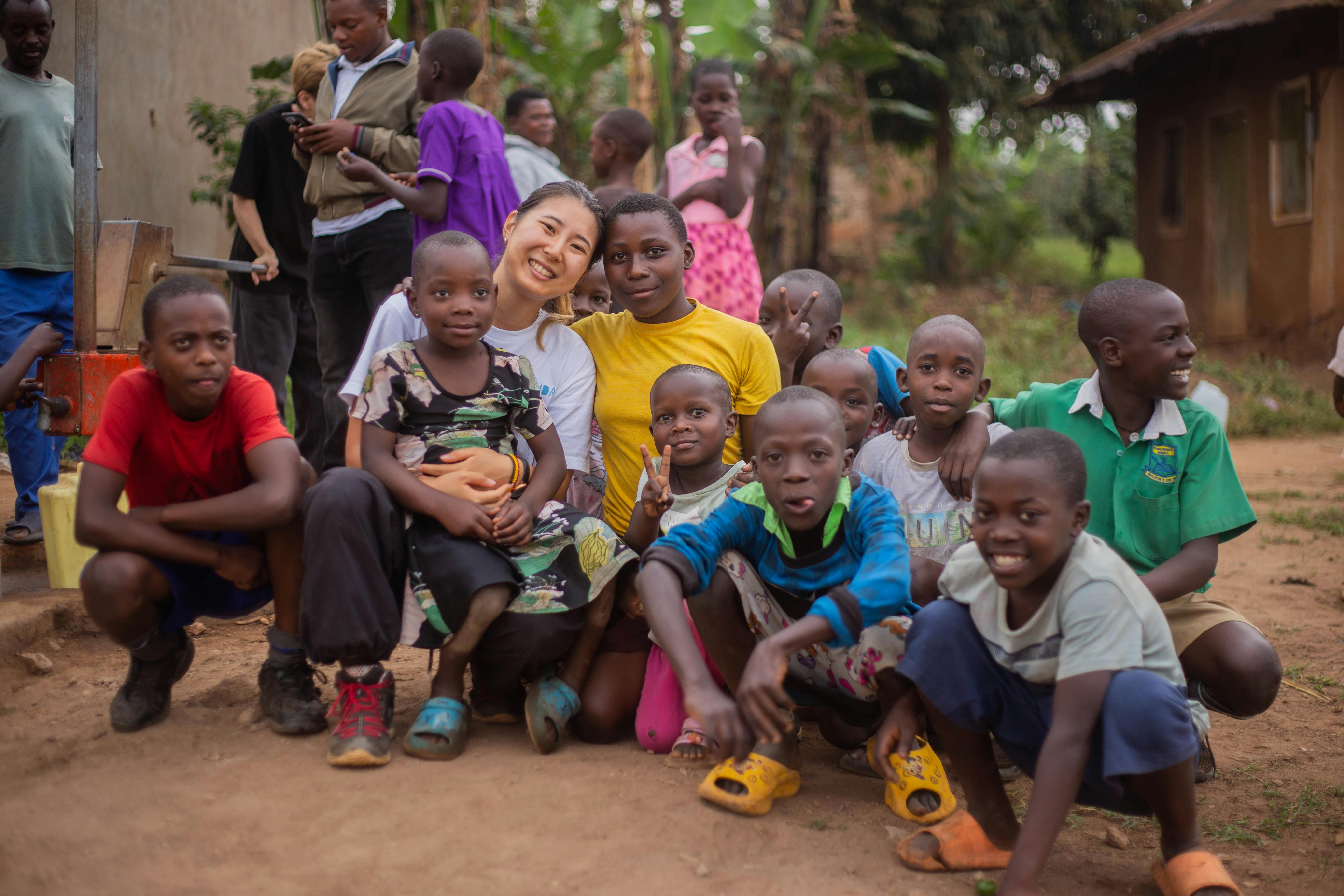 A group of children and adults posing for a photo · Free Stock Photo