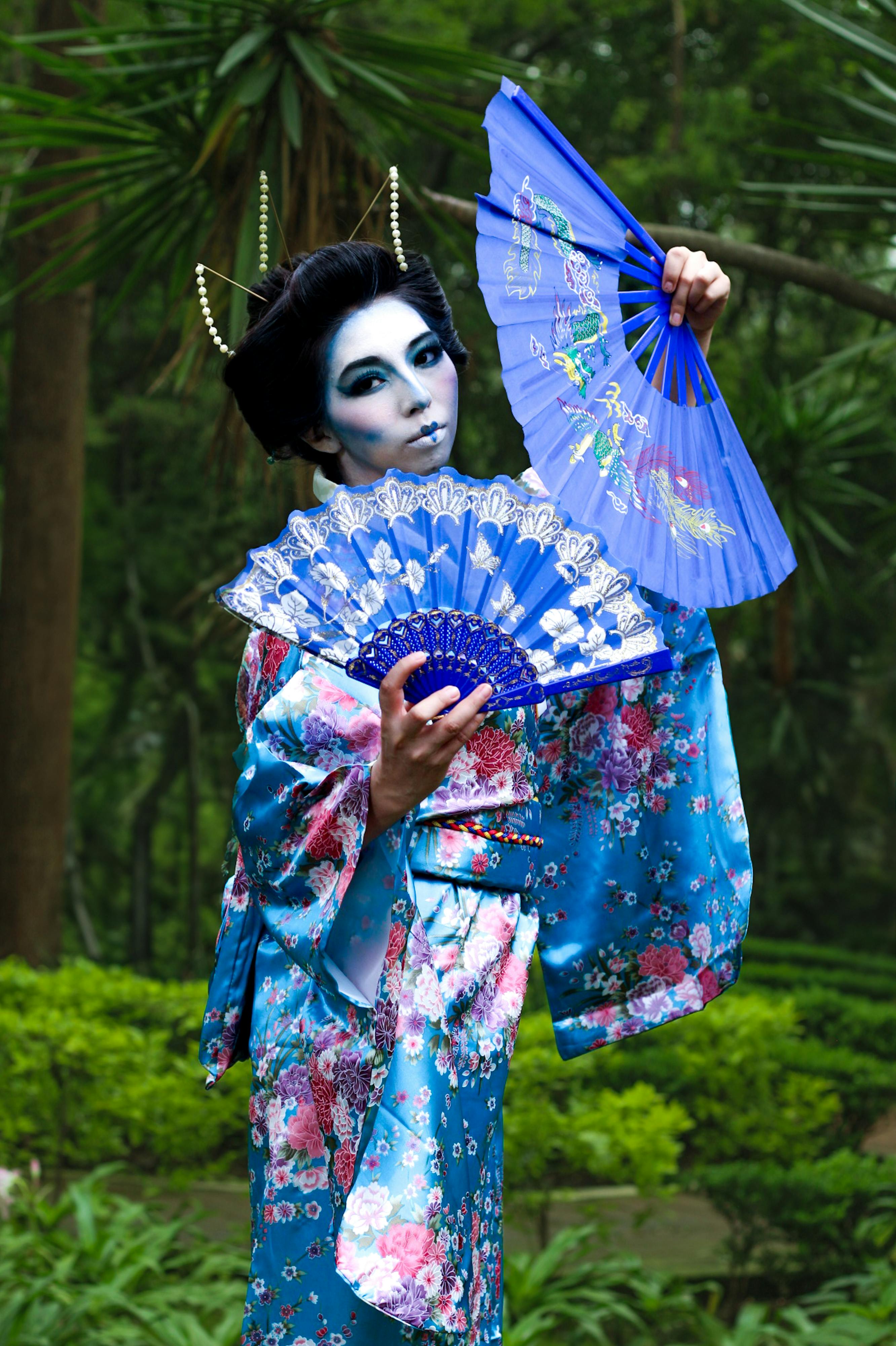 Woman Wearing Kimono Holding Fan · Free Stock Photo