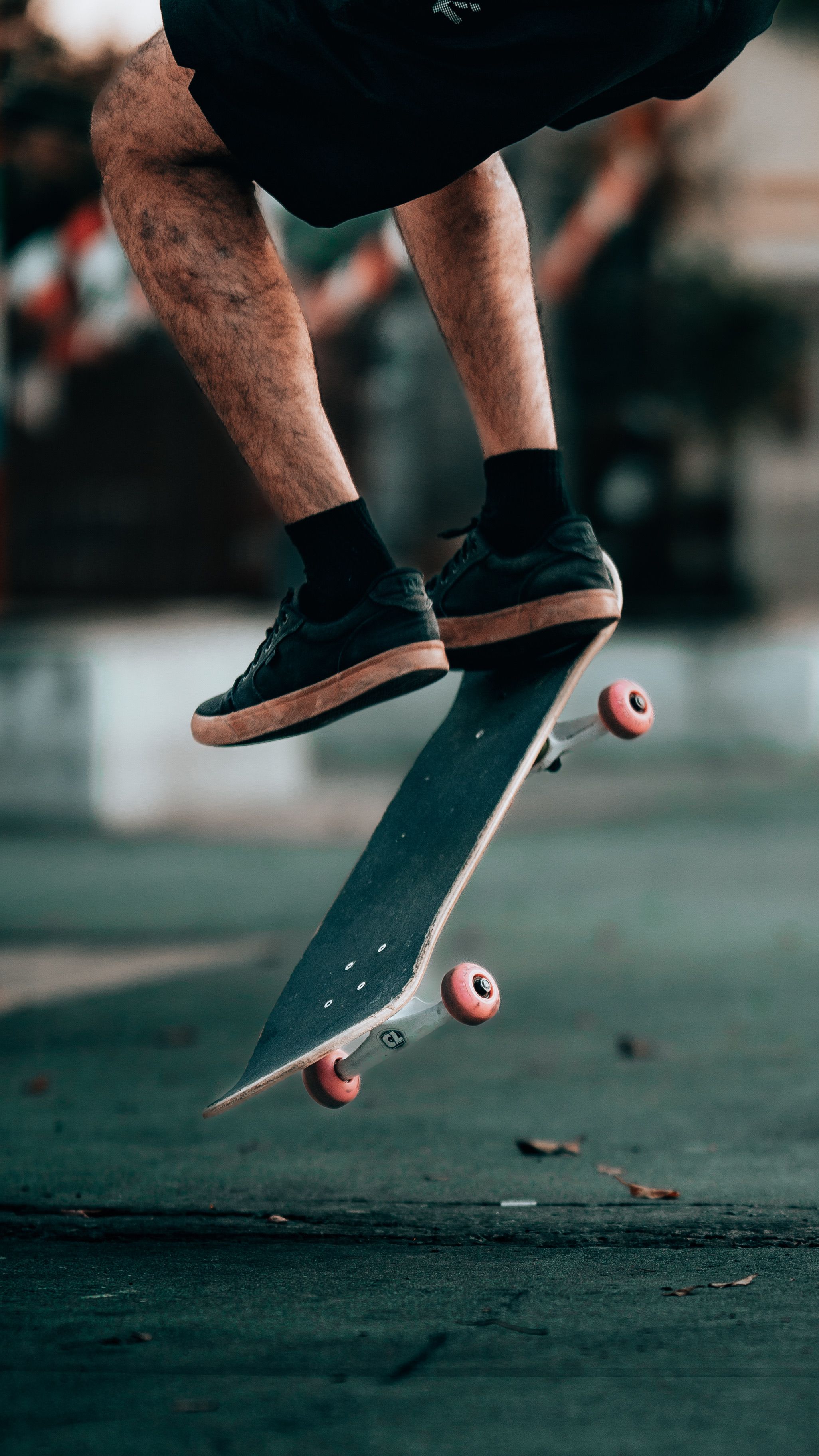 A person is doing a trick on a skateboard · Free Stock Photo