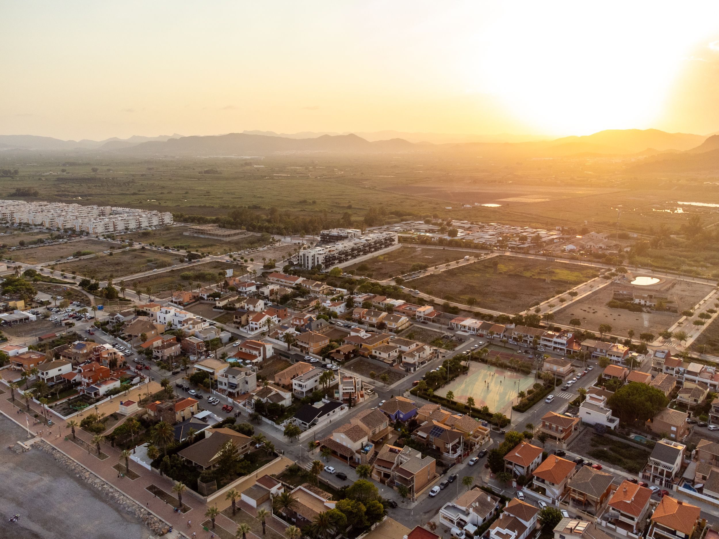 Aerial view of a small town at sunset · Free Stock Photo