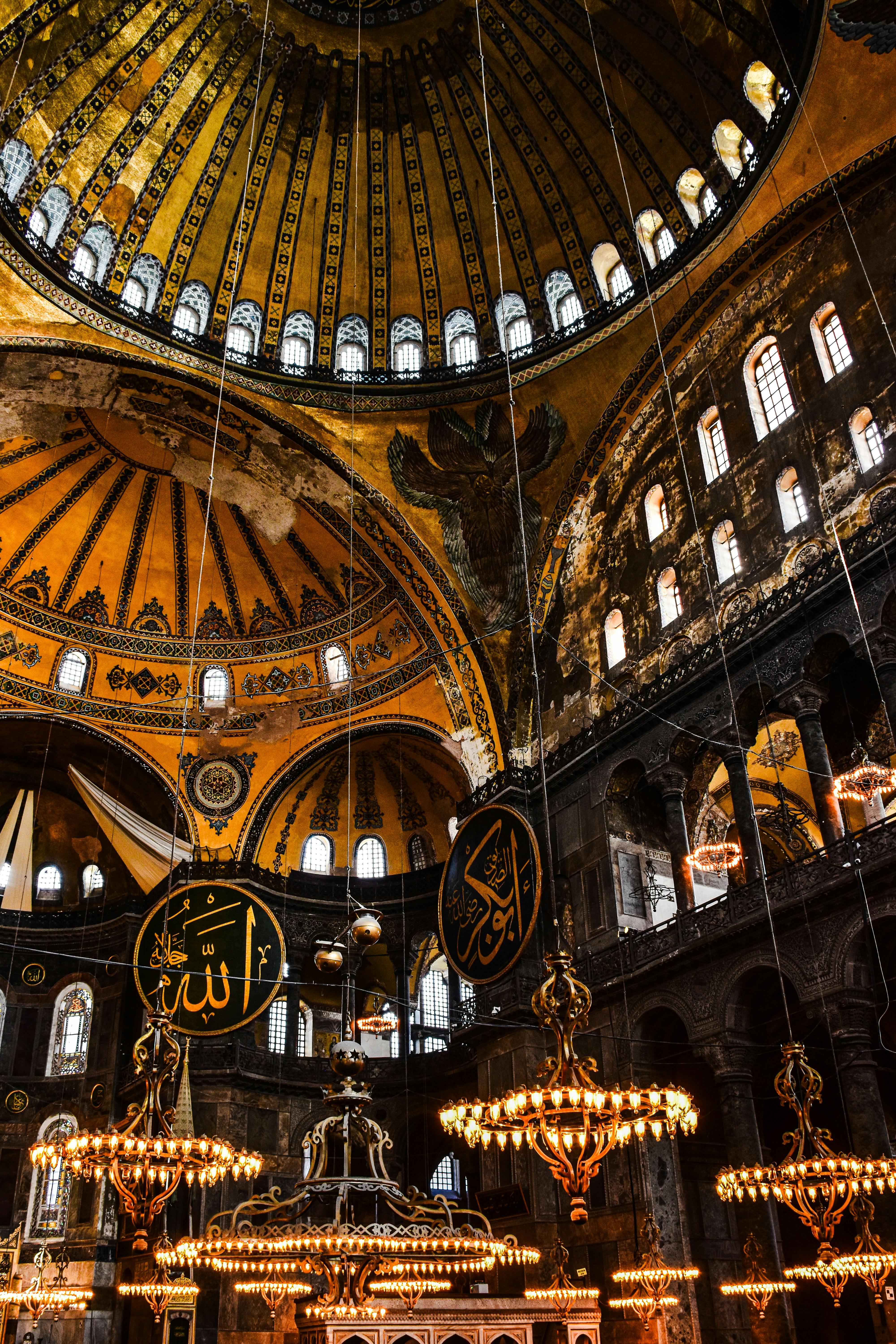 Interior of old mosque with classic chandeliers · Free Stock Photo