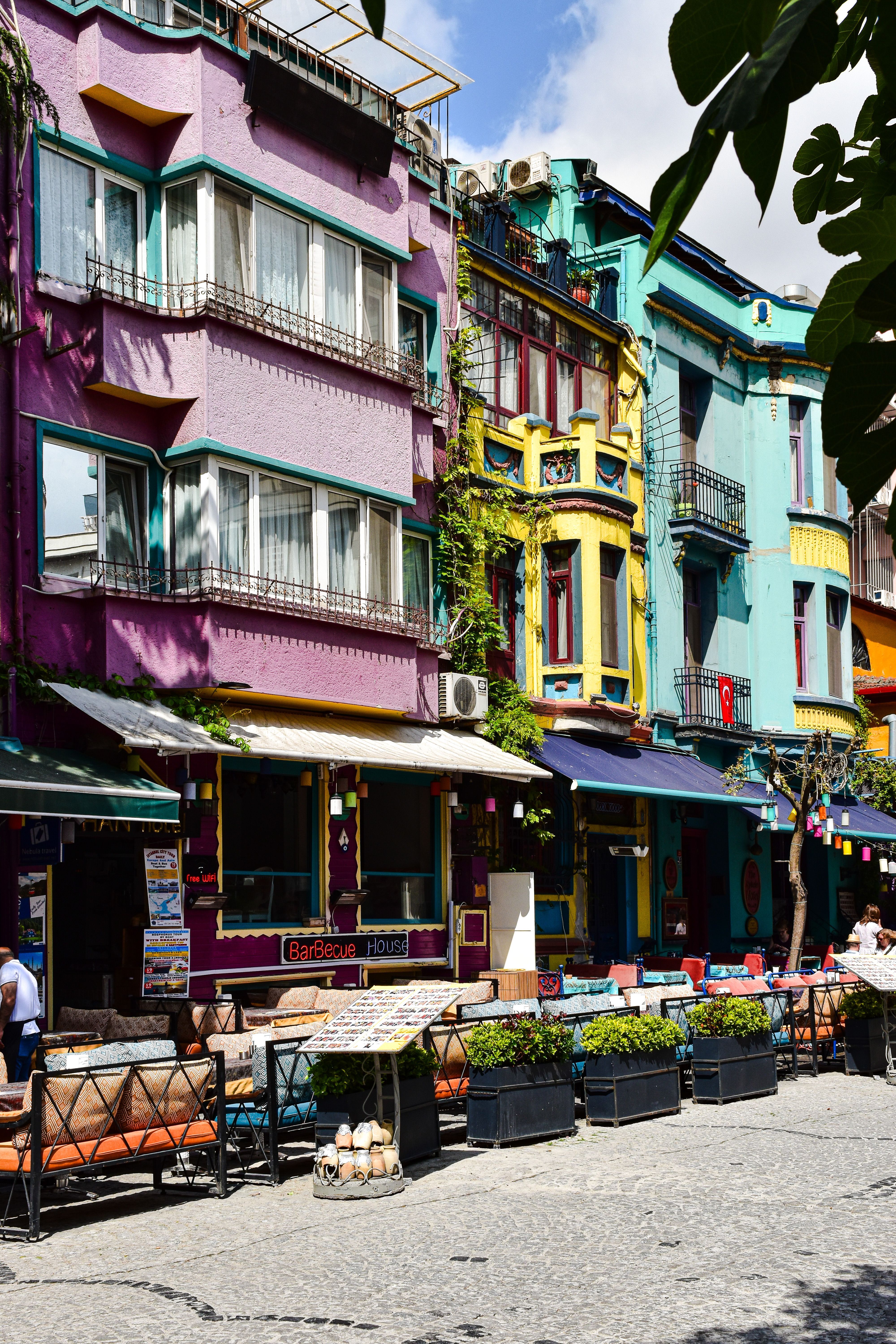 A colorful street with many colorful buildings · Free Stock Photo