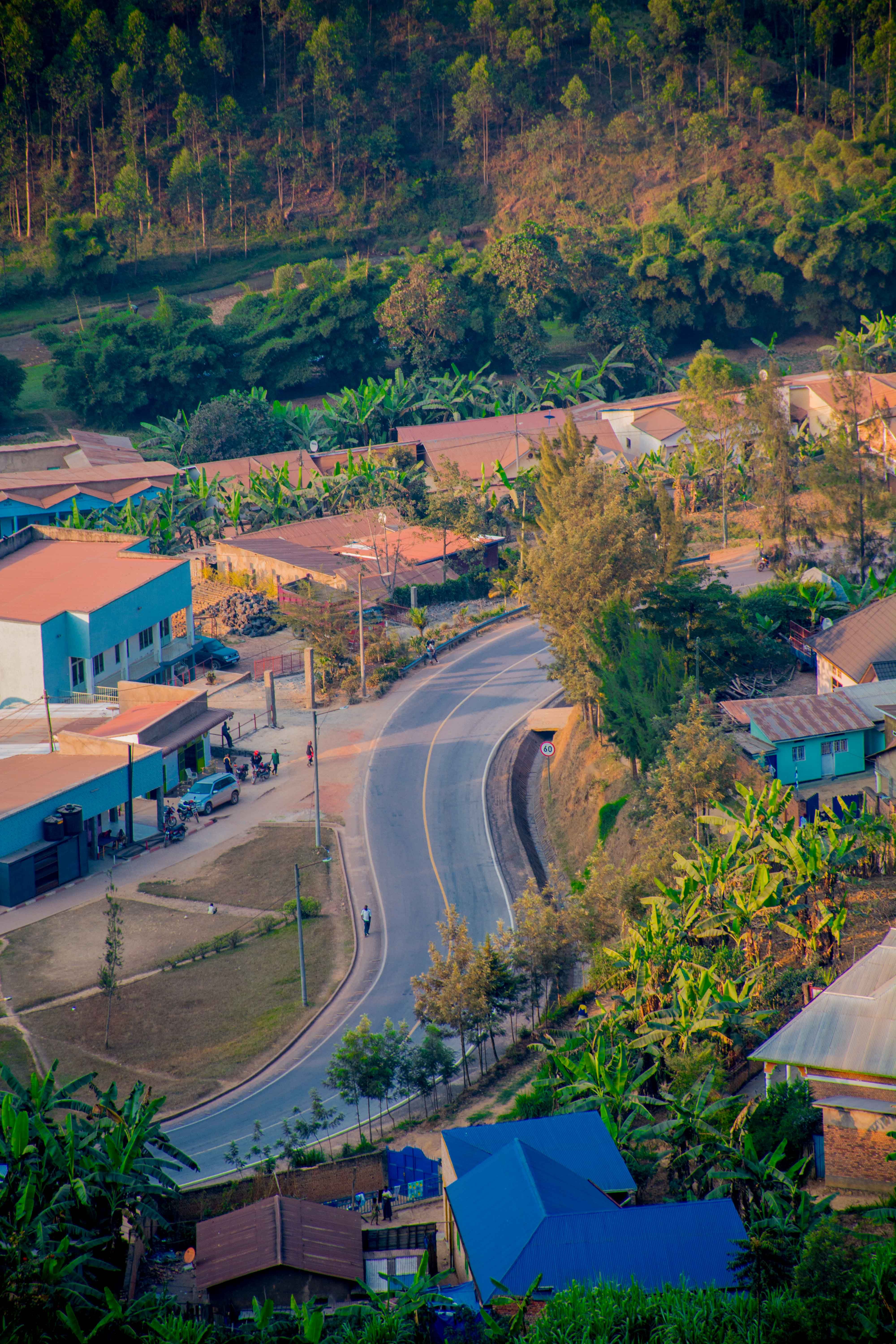 A view of a small town with a road running through it · Free Stock Photo