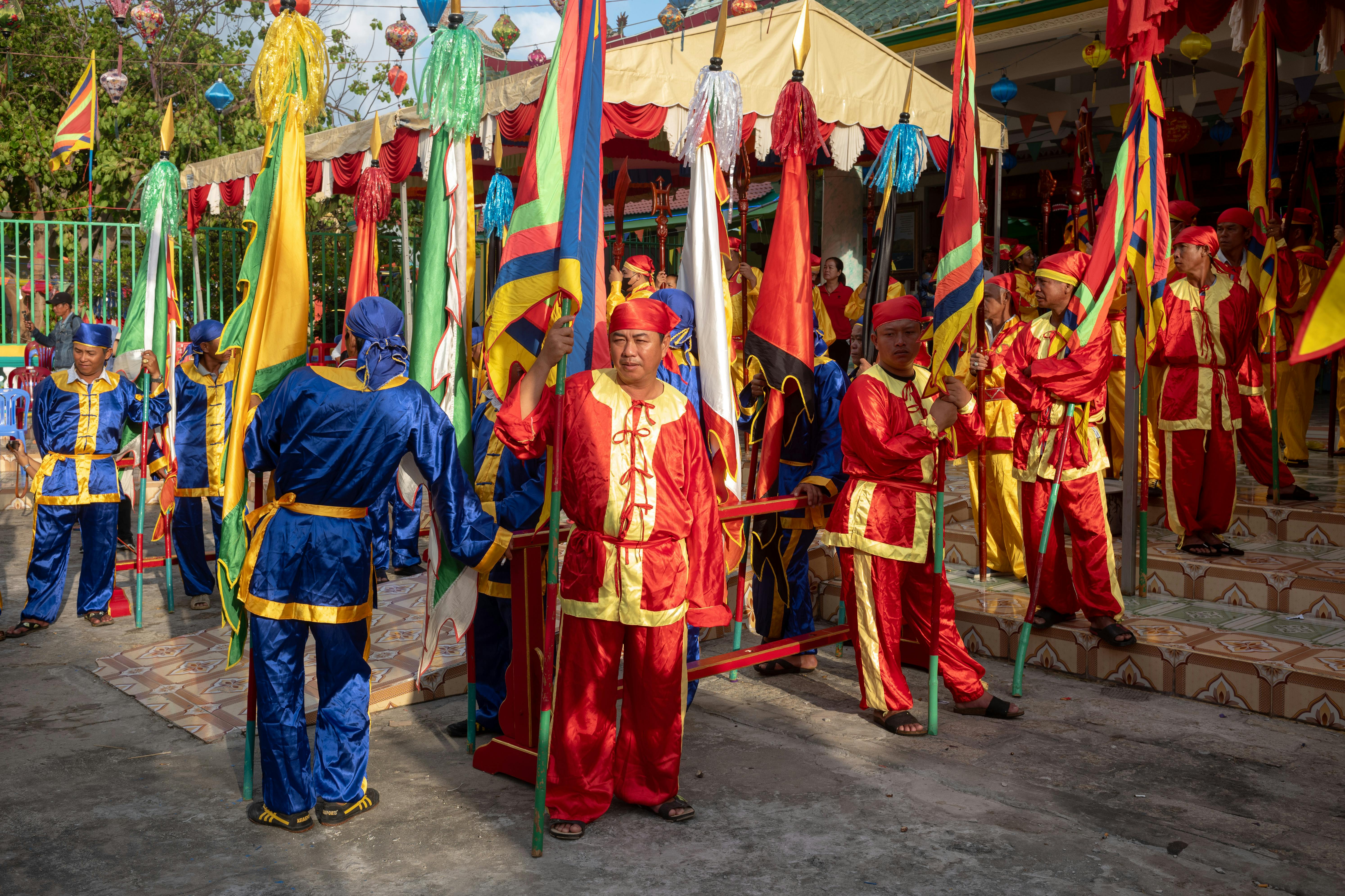 A group of people dressed in colorful costumes · Free Stock Photo