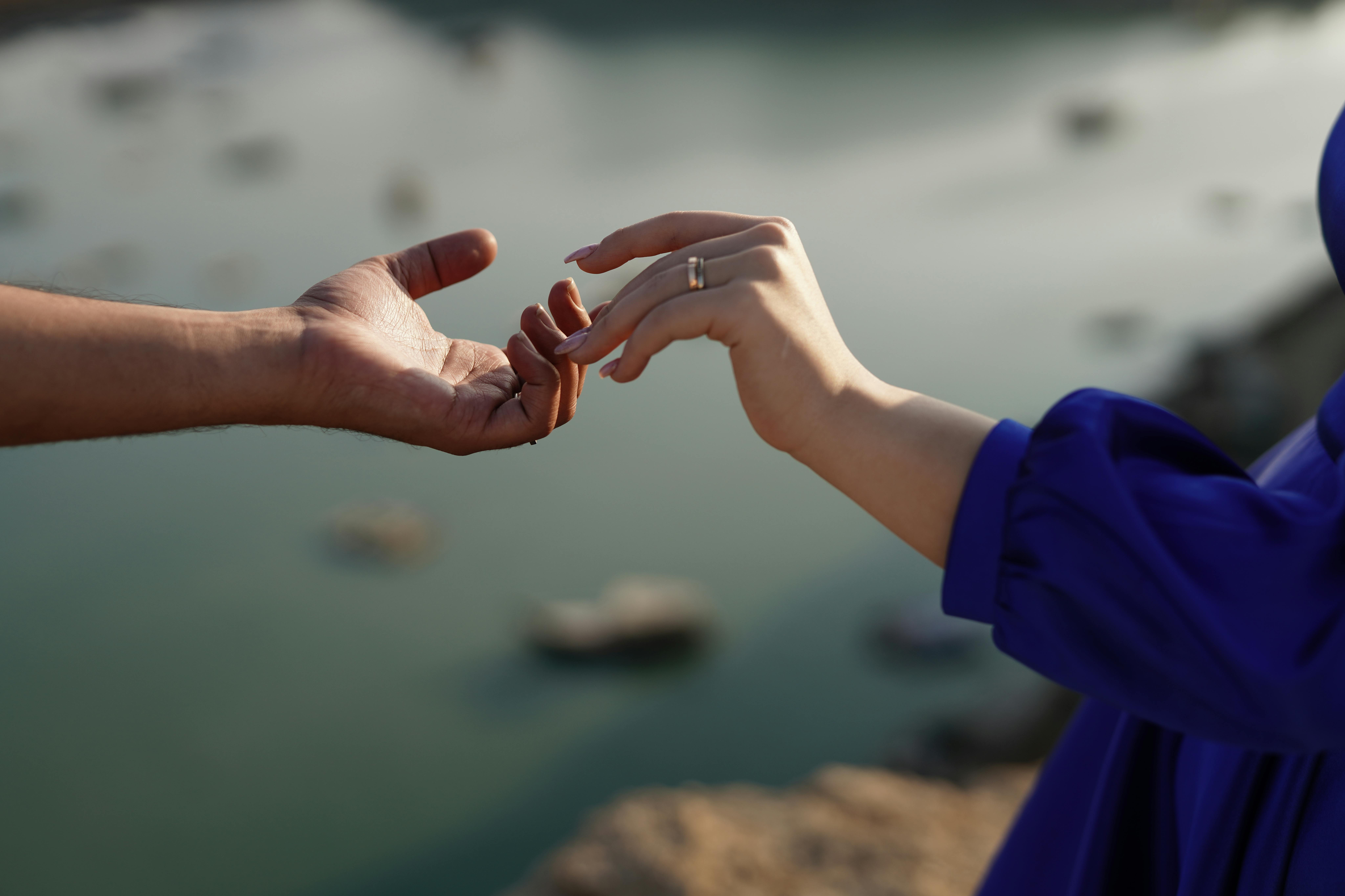 Two Person Hold Hands · Free Stock Photo
