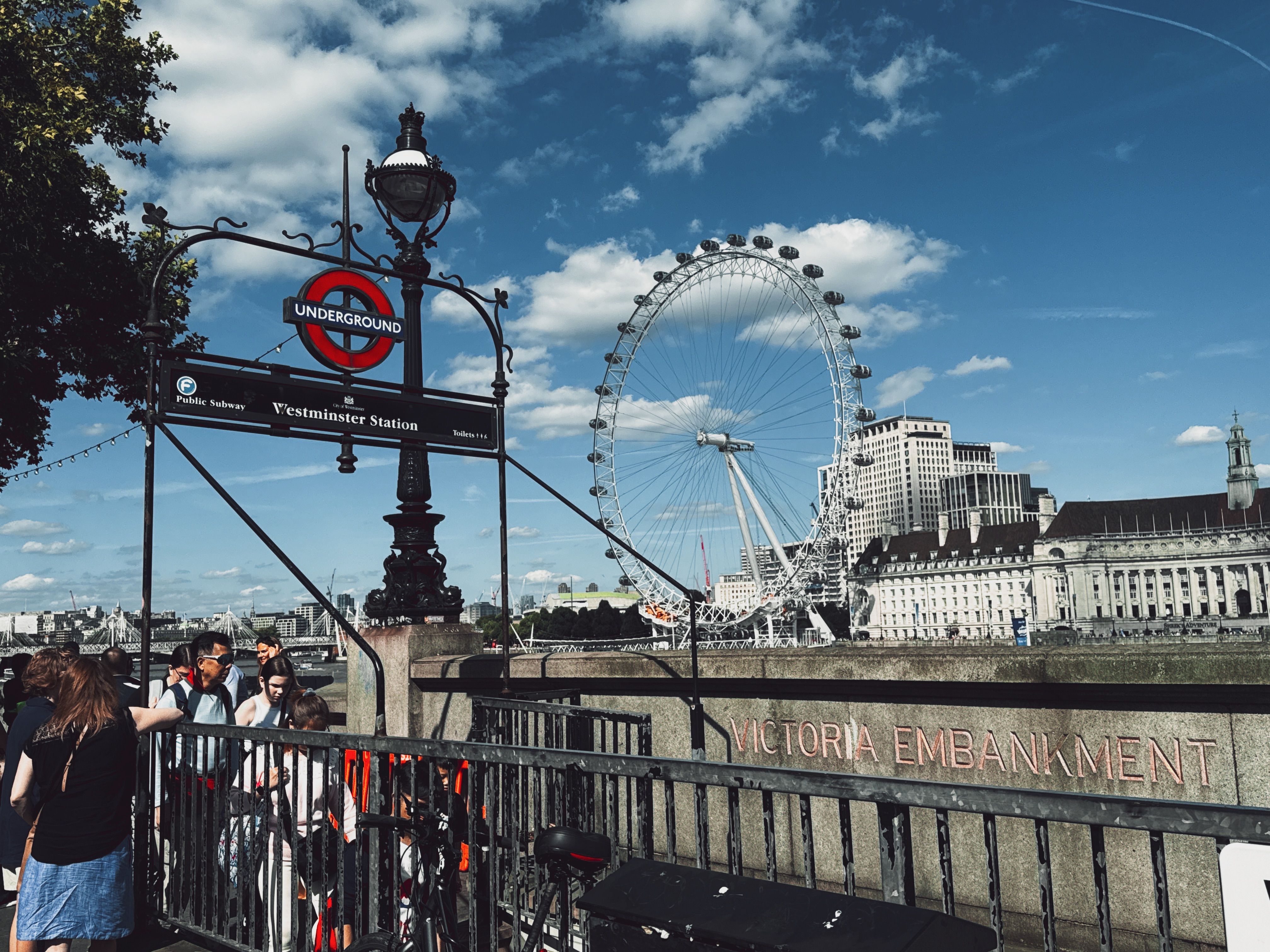 A view of the london eye and people walking by · Free Stock Photo