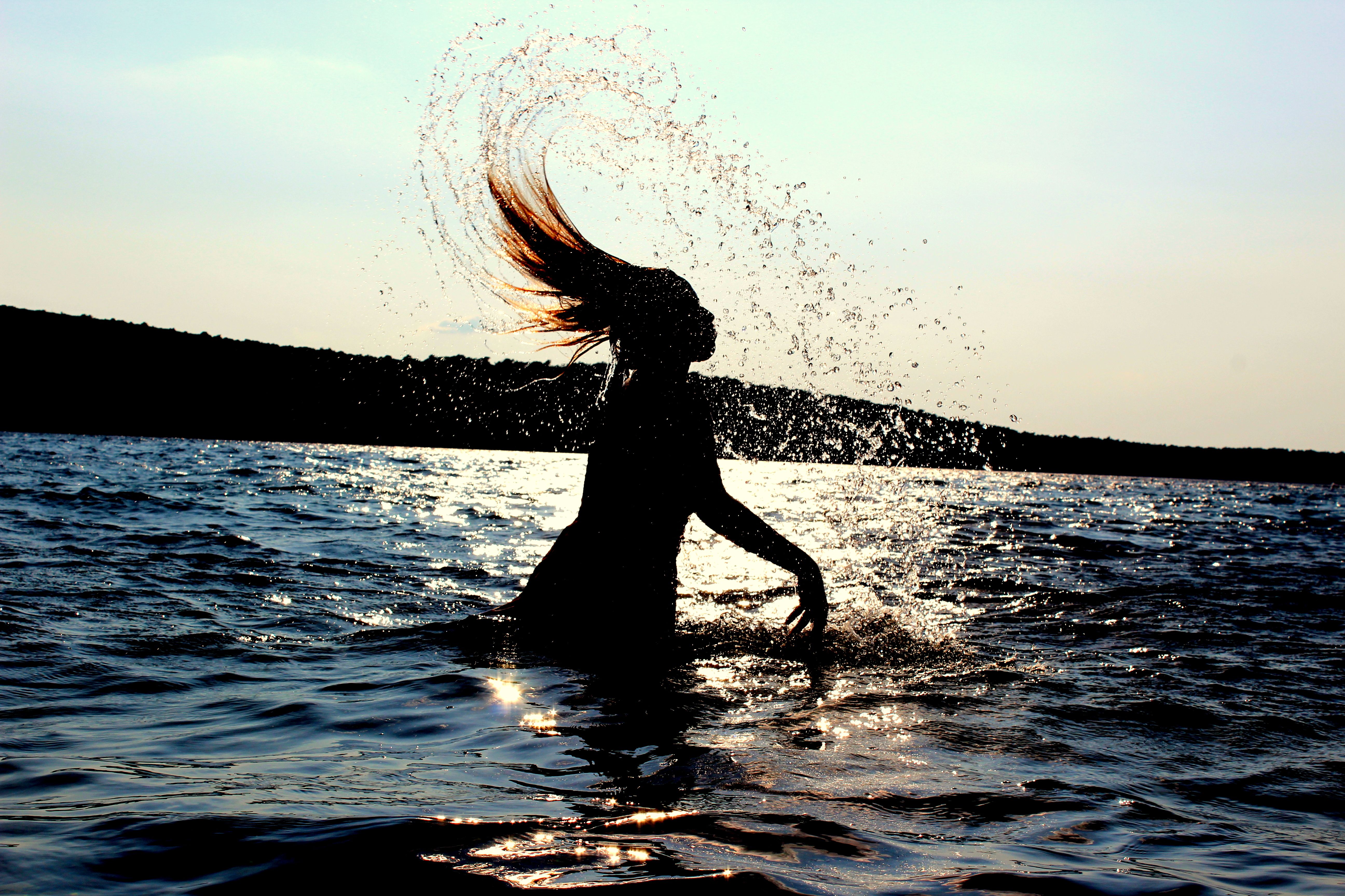 Woman Doing Hair Flip · Free Stock Photo