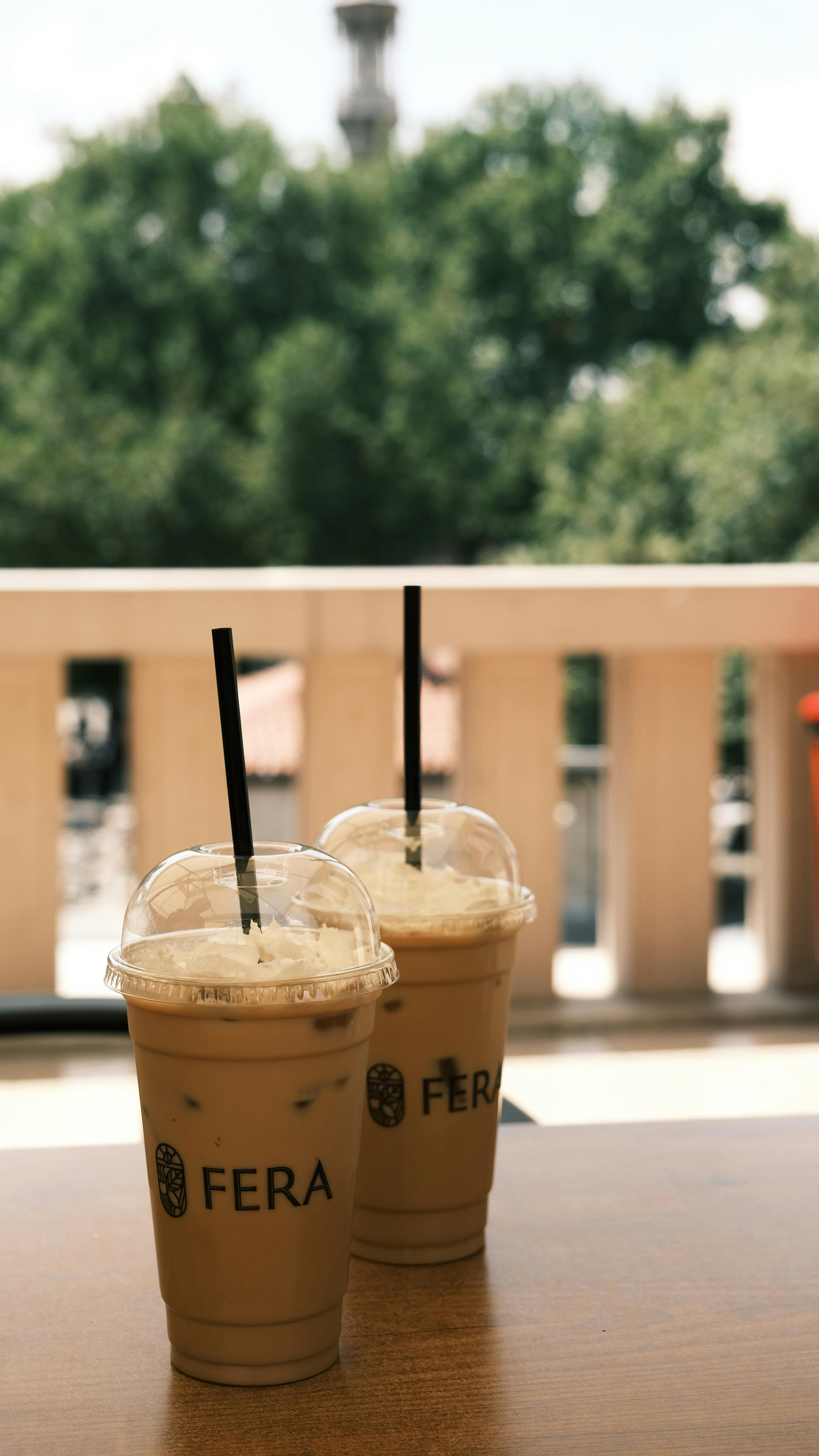 Cold Coffee in Glass on Cafe Table · Free Stock Photo