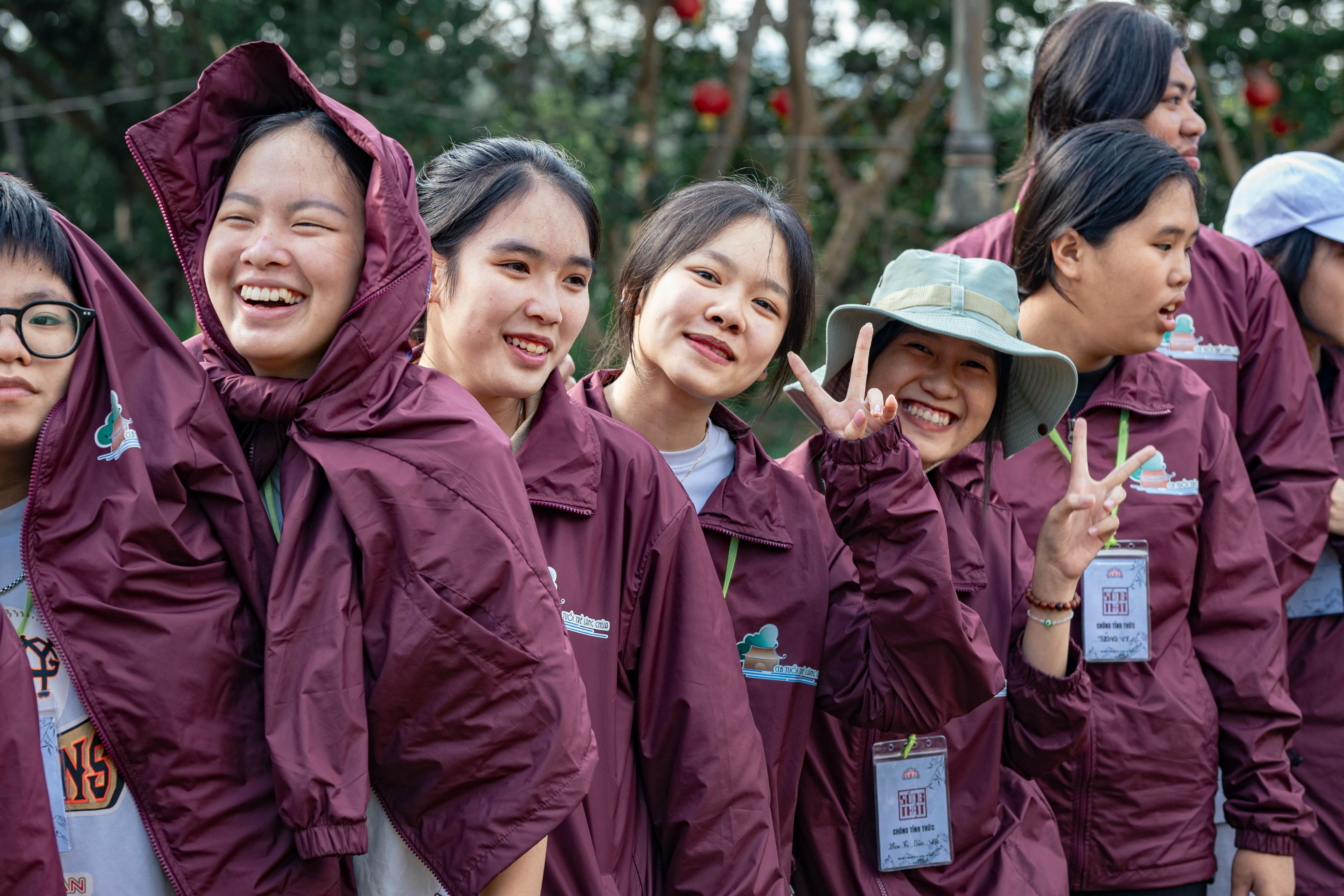 A group of girls in maroon jackets and hats · Free Stock Photo