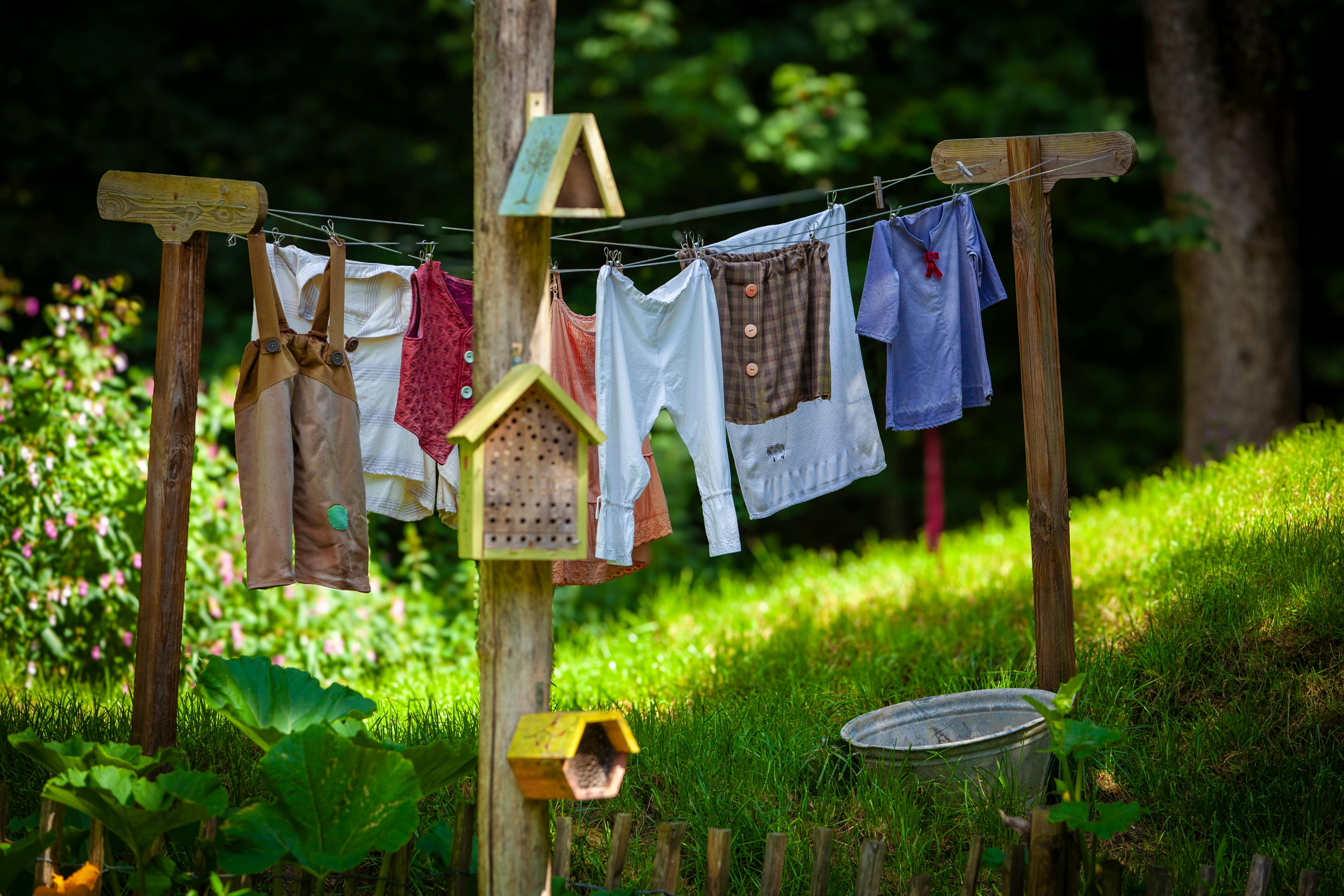 A clothesline with clothes hanging on it · Free Stock Photo