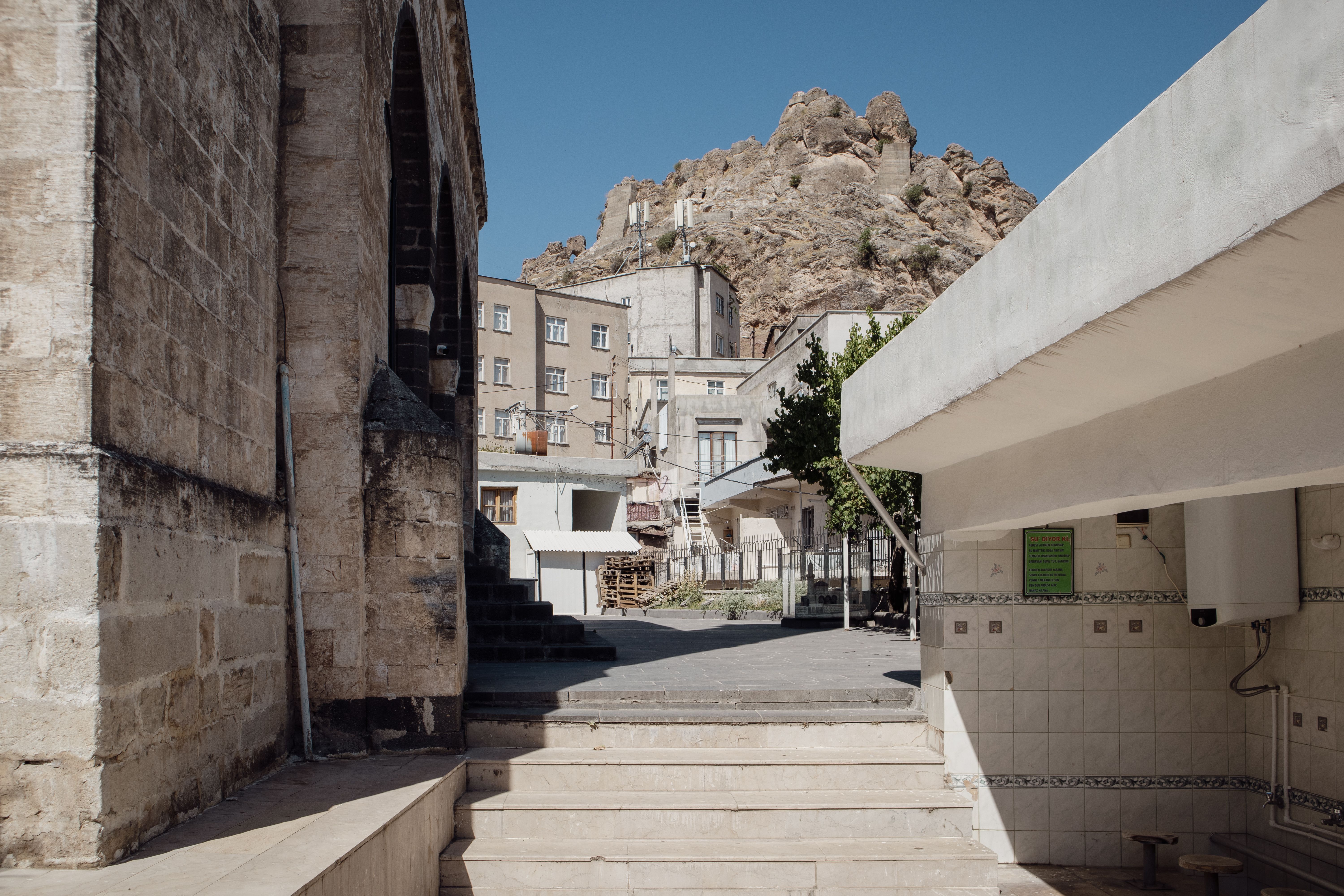 A view of a street with steps leading up to a building · Free Stock Photo