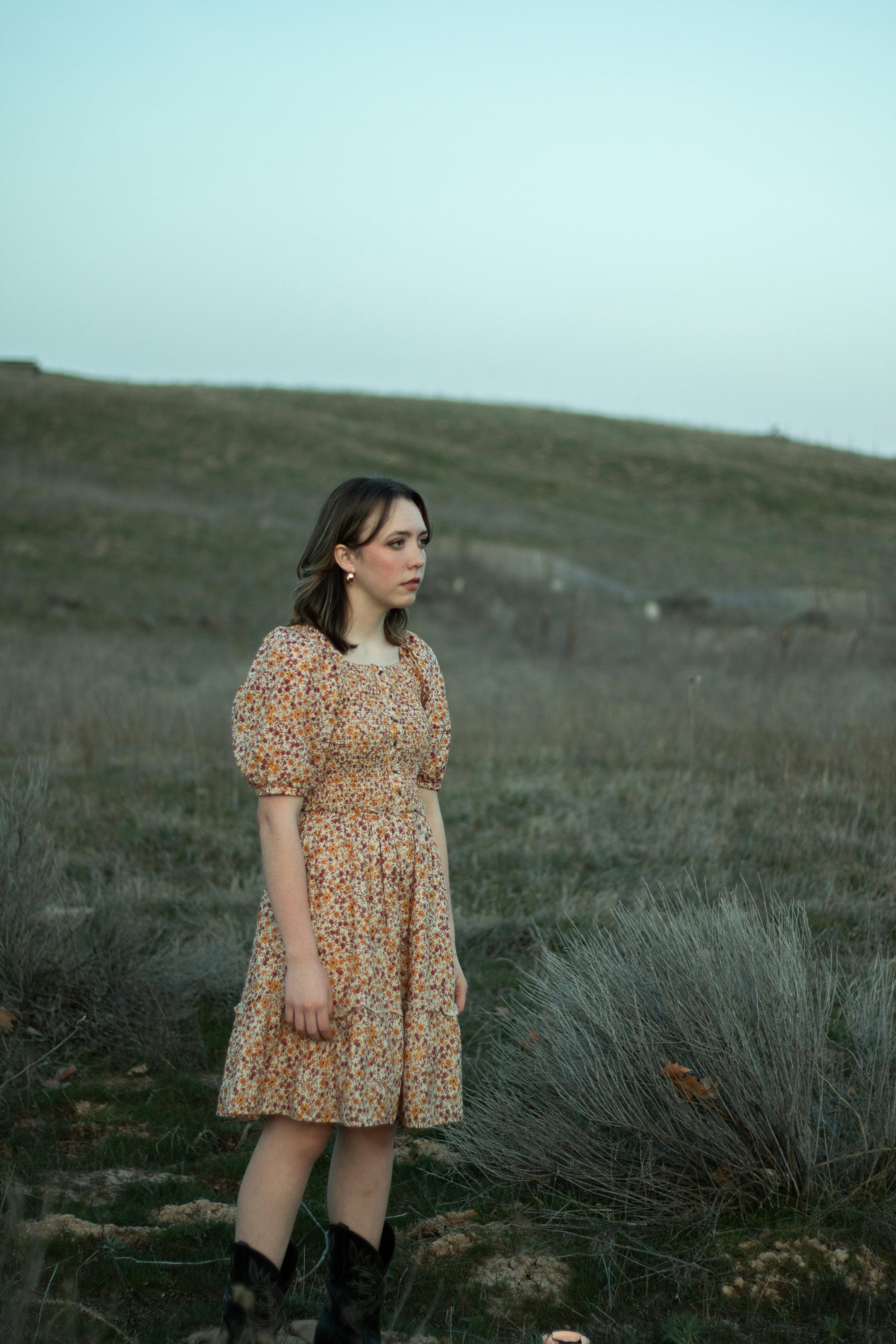 Female Contemplating And Looking At The Seasons Of The Heart In The ...