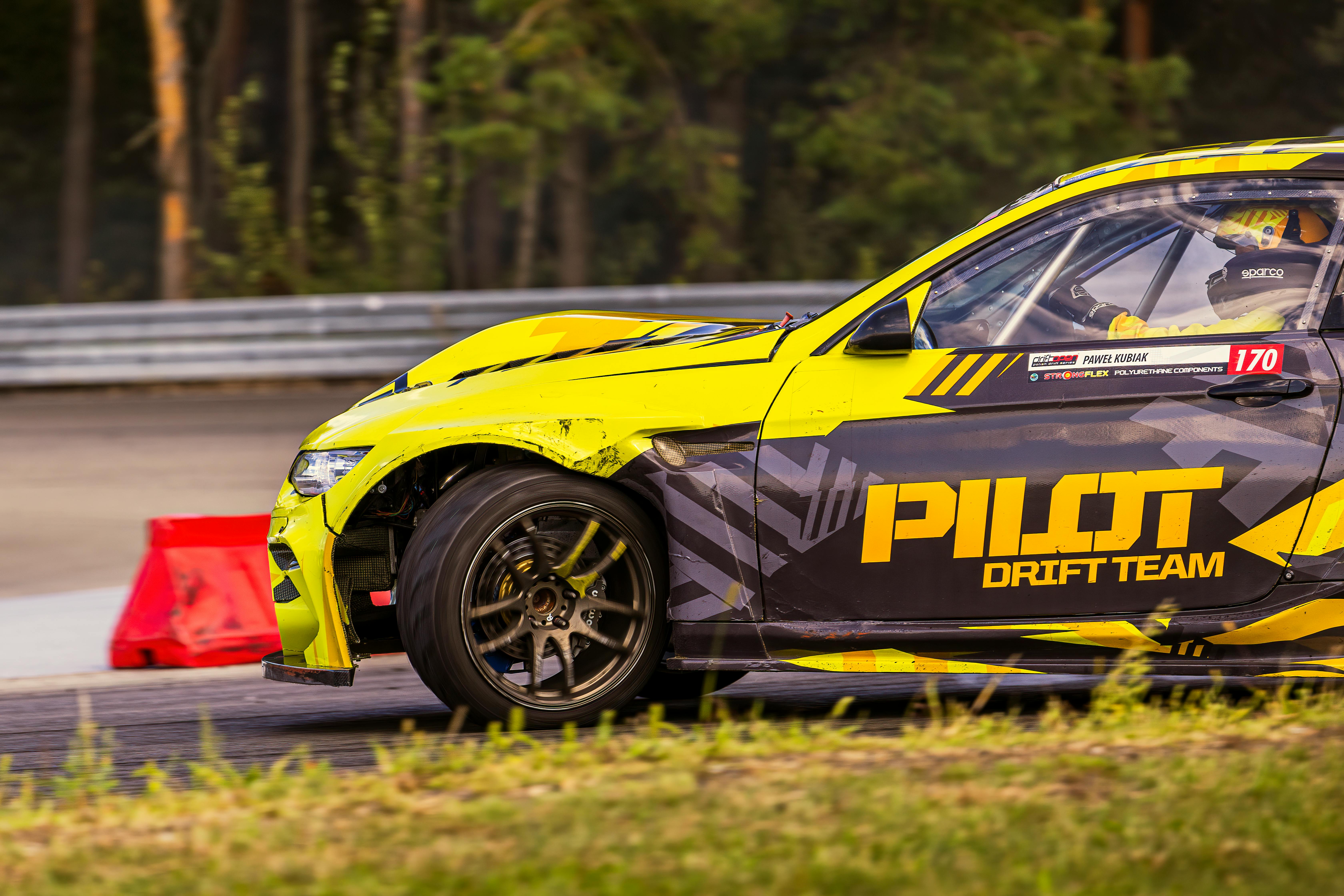 Yellow Mazda RX-7 Drifting at Car Event · Free Stock Photo