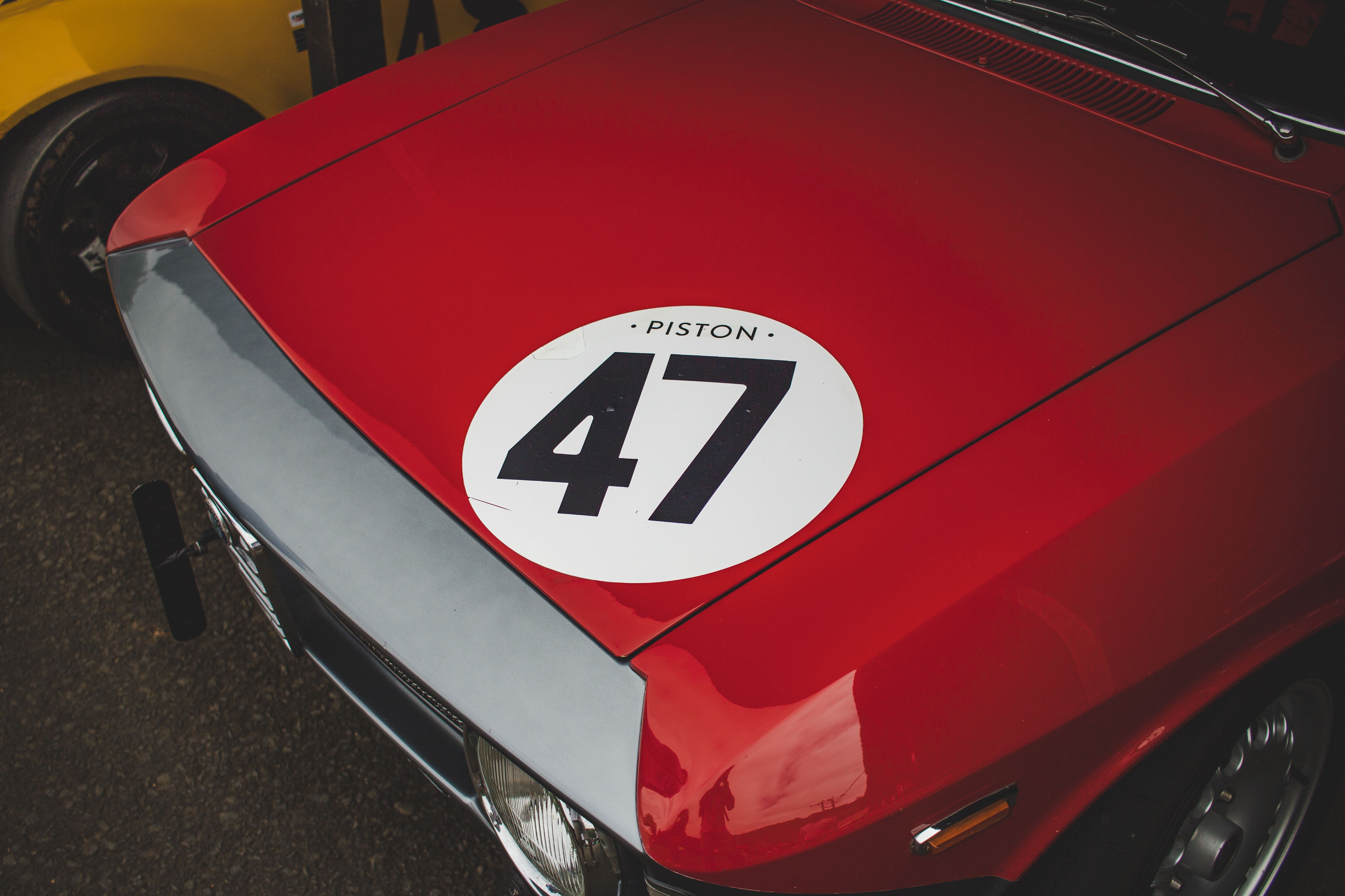 A red car with number 47 on it · Free Stock Photo