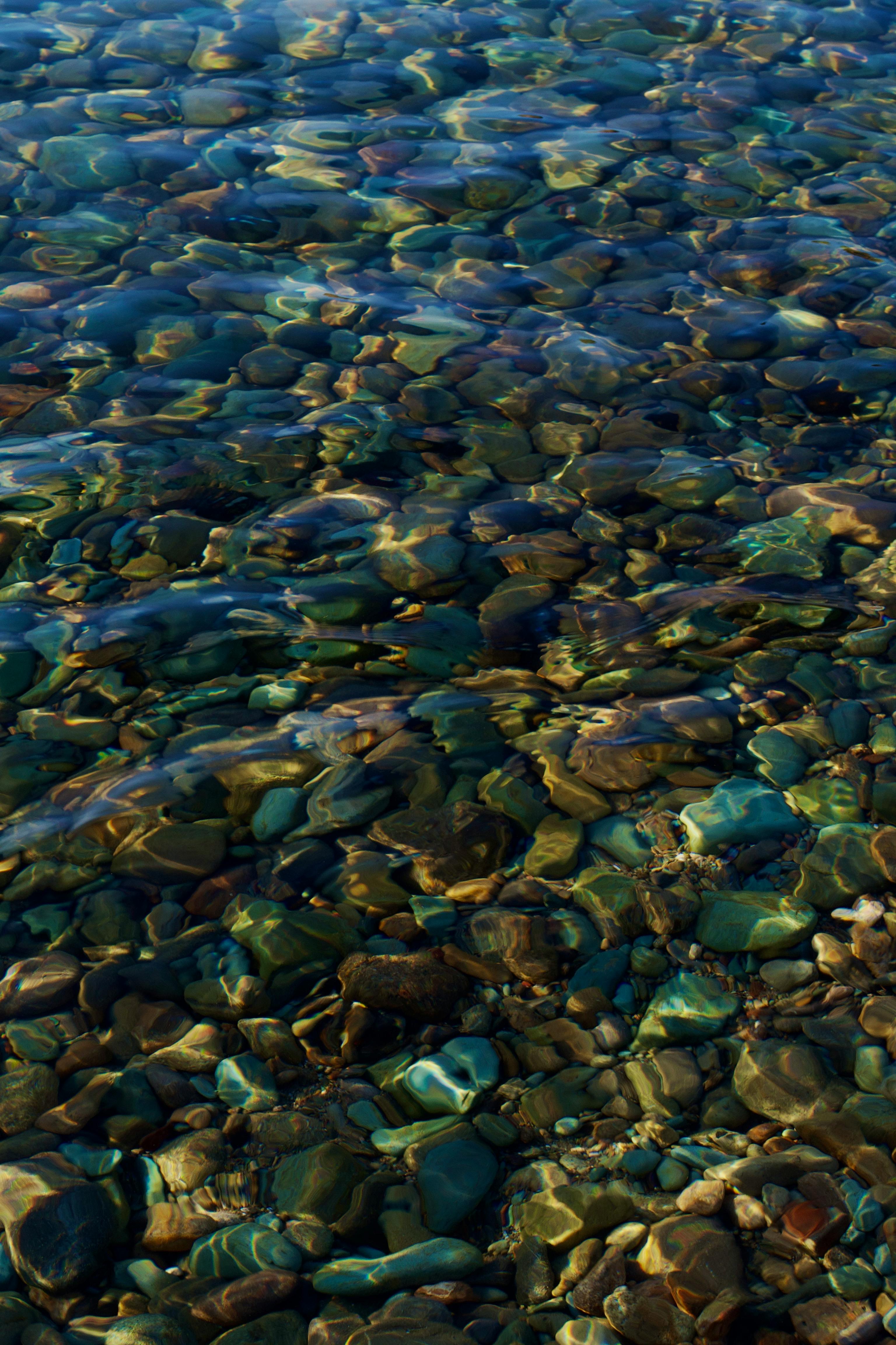 Teal and Multicolored Stone in Clear Body of Water · Free Stock Photo